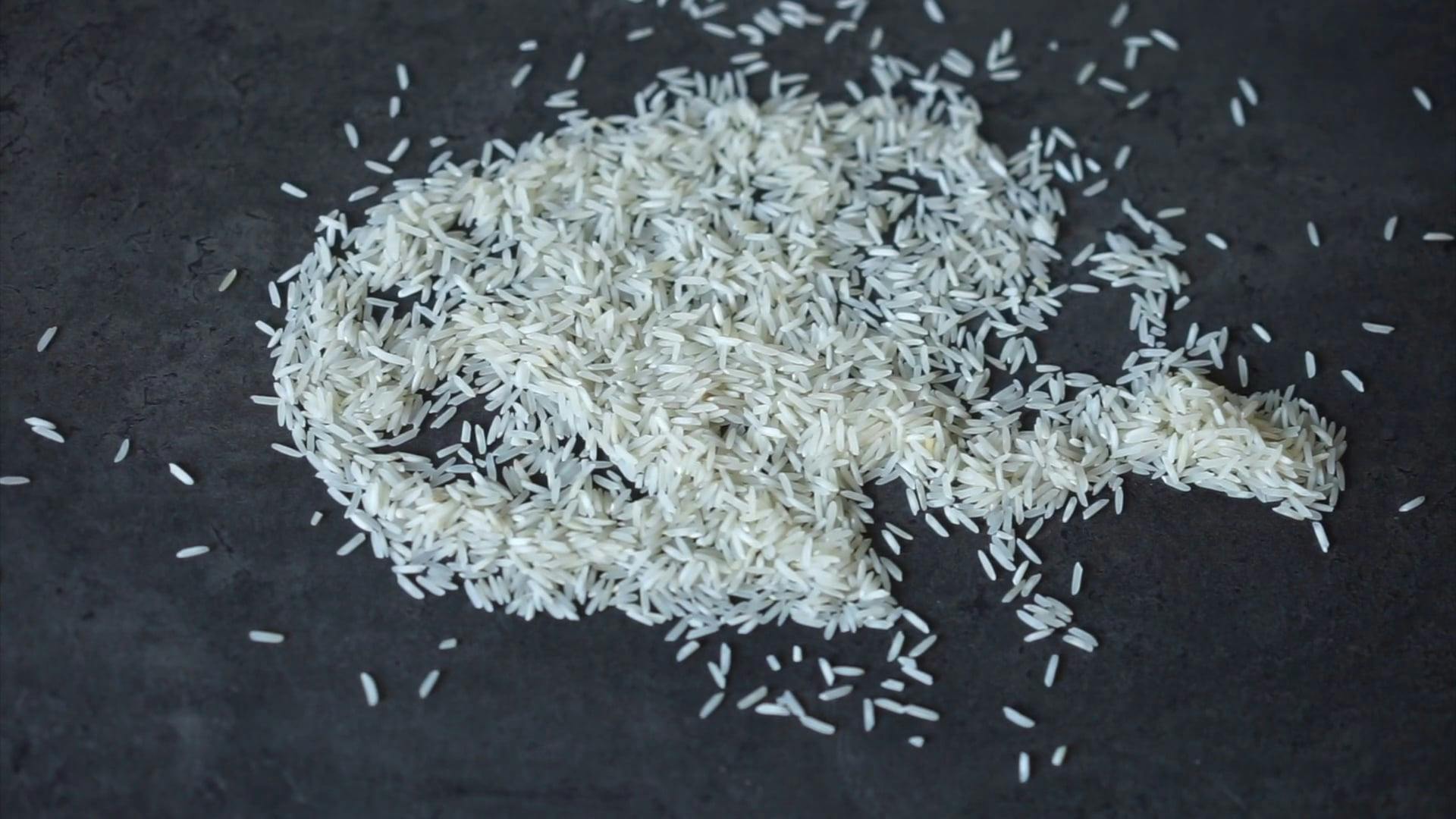 Pouring Rice Grains · Free Stock Video