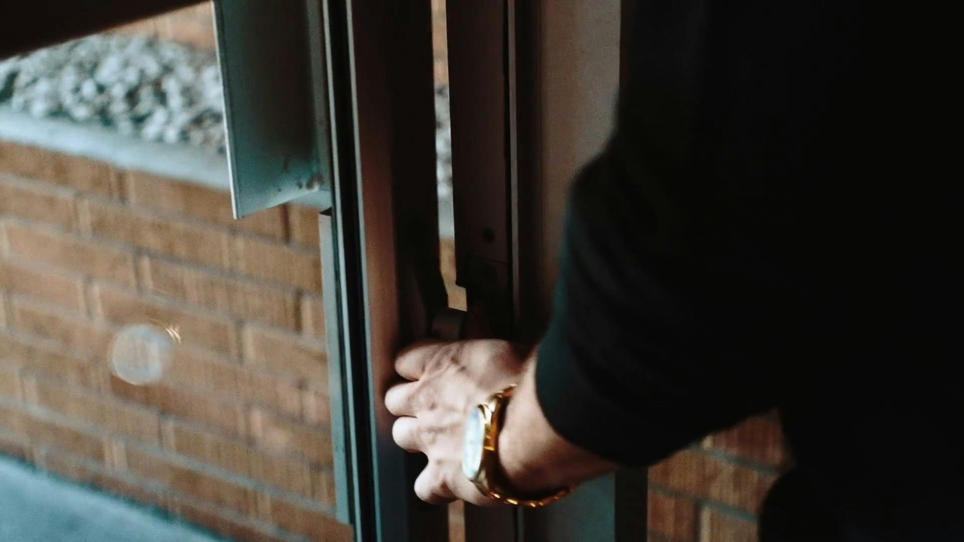 A Person Opening a Door and Checking Outside at Night Free Stock Video ...