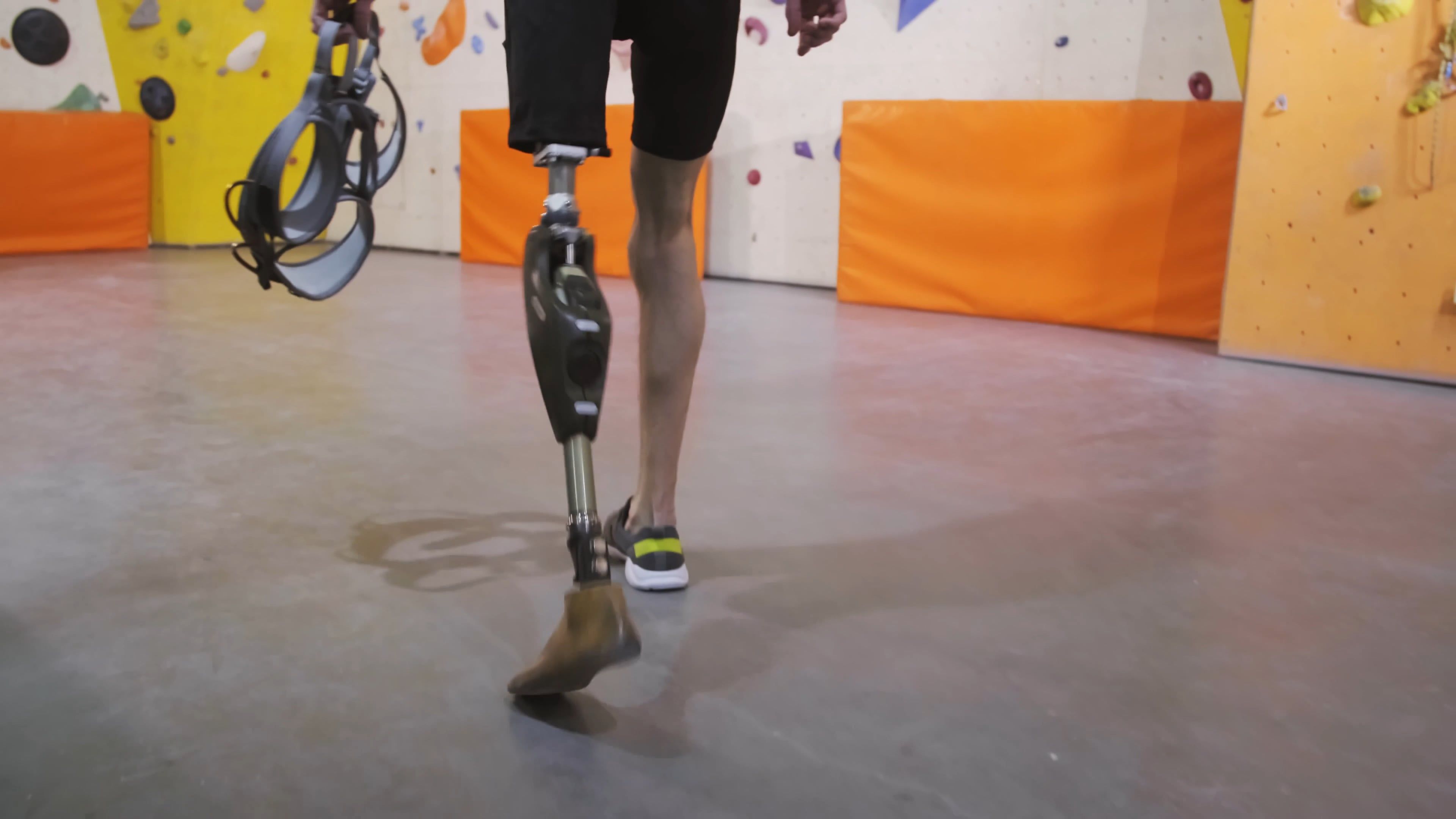 A Man Wearing Prosthesis Leg Going For A Wall Climbing Adventure Free ...