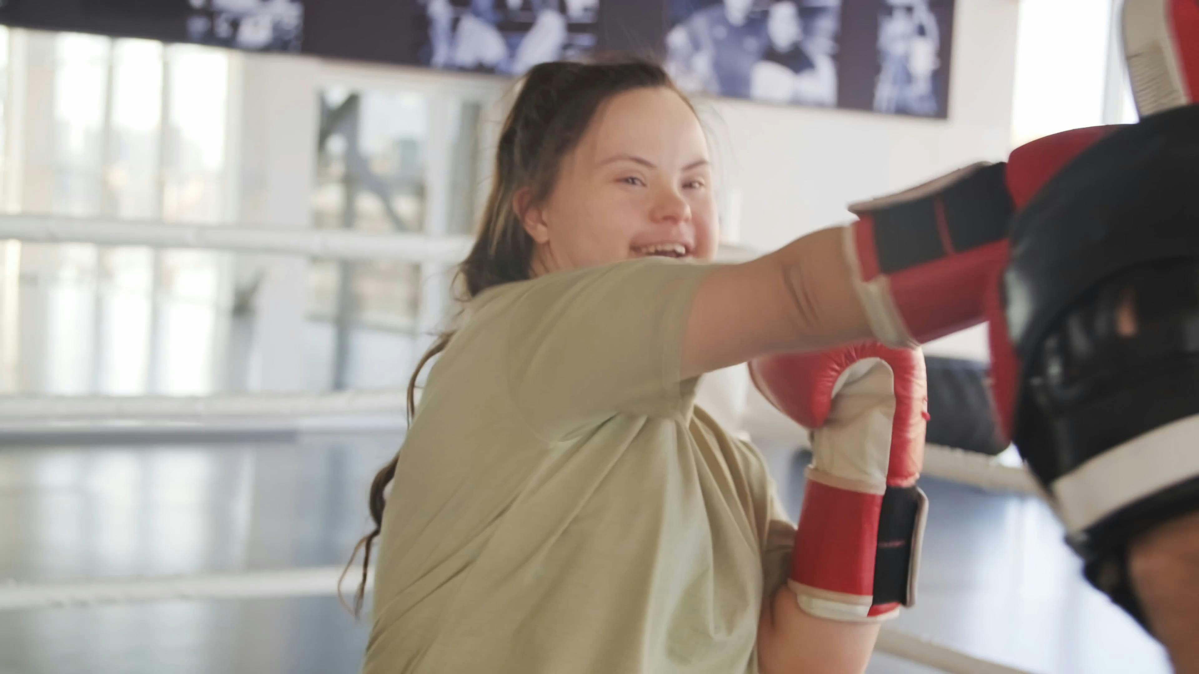 A Woman Throwing And Dodging Punches In A Boxing Exercise · Free Stock ...