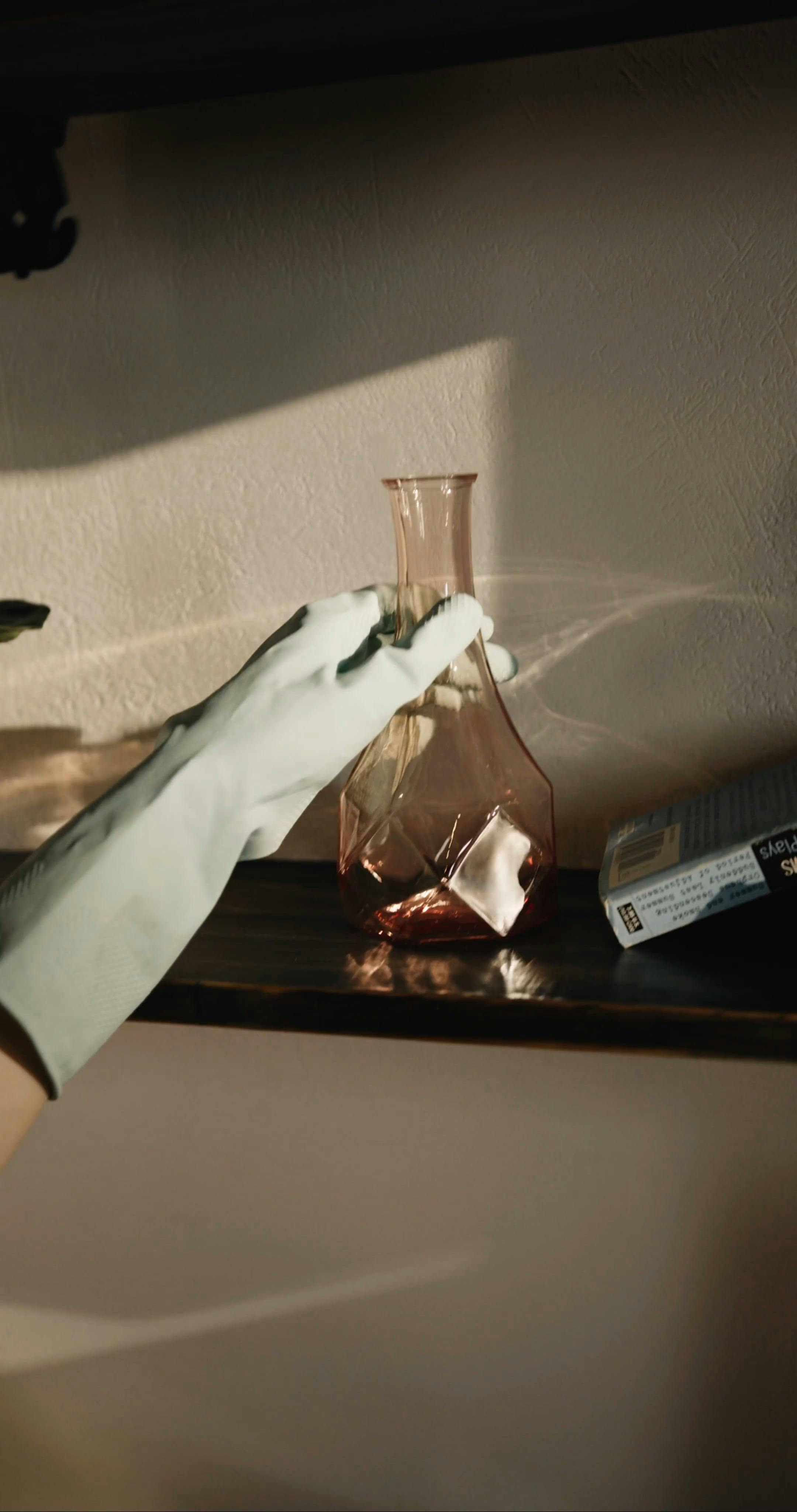 A Woman Cleaning A Glass Vase Free Stock Video Footage, Royalty-Free 4K ...