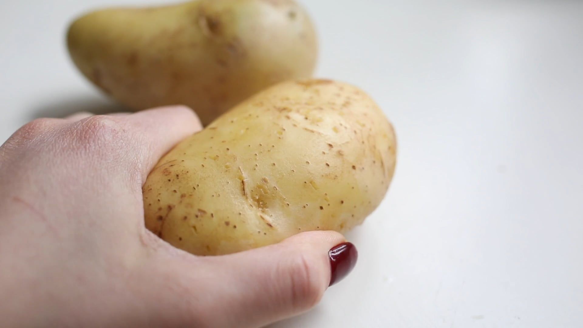 A Person Poking a Potato with a Fork · Free Stock Video