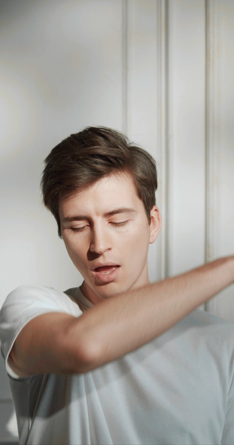 A Sick Man Cover Himself With A Thick Blanket While Drinking Hot Tea Free Stock Video Footage
