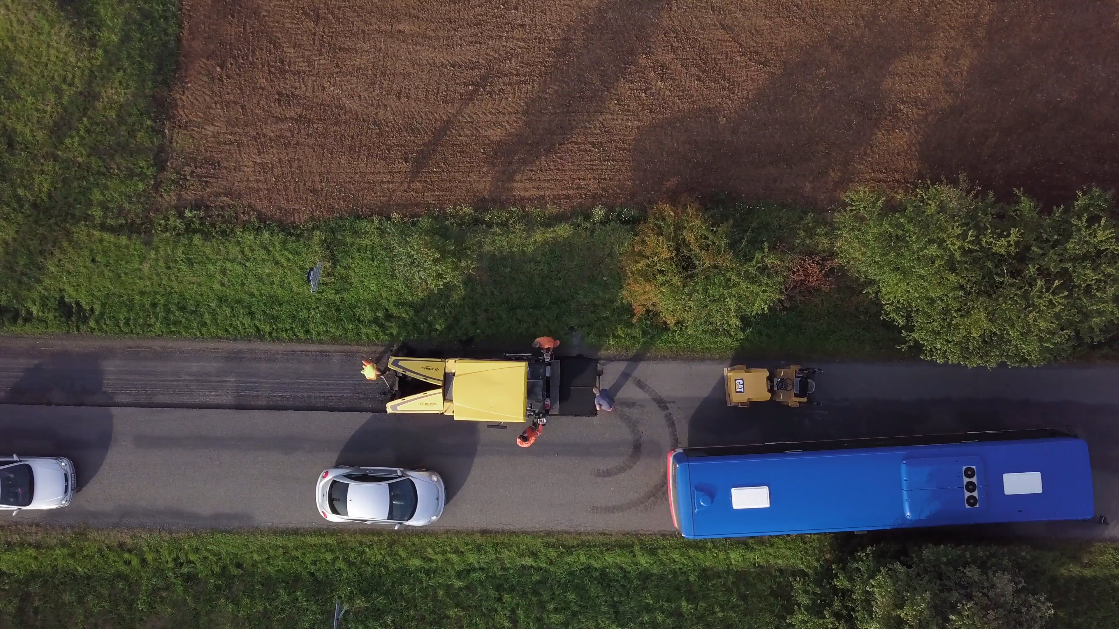 Top-View of Men Doing Road Works · Free Stock Video