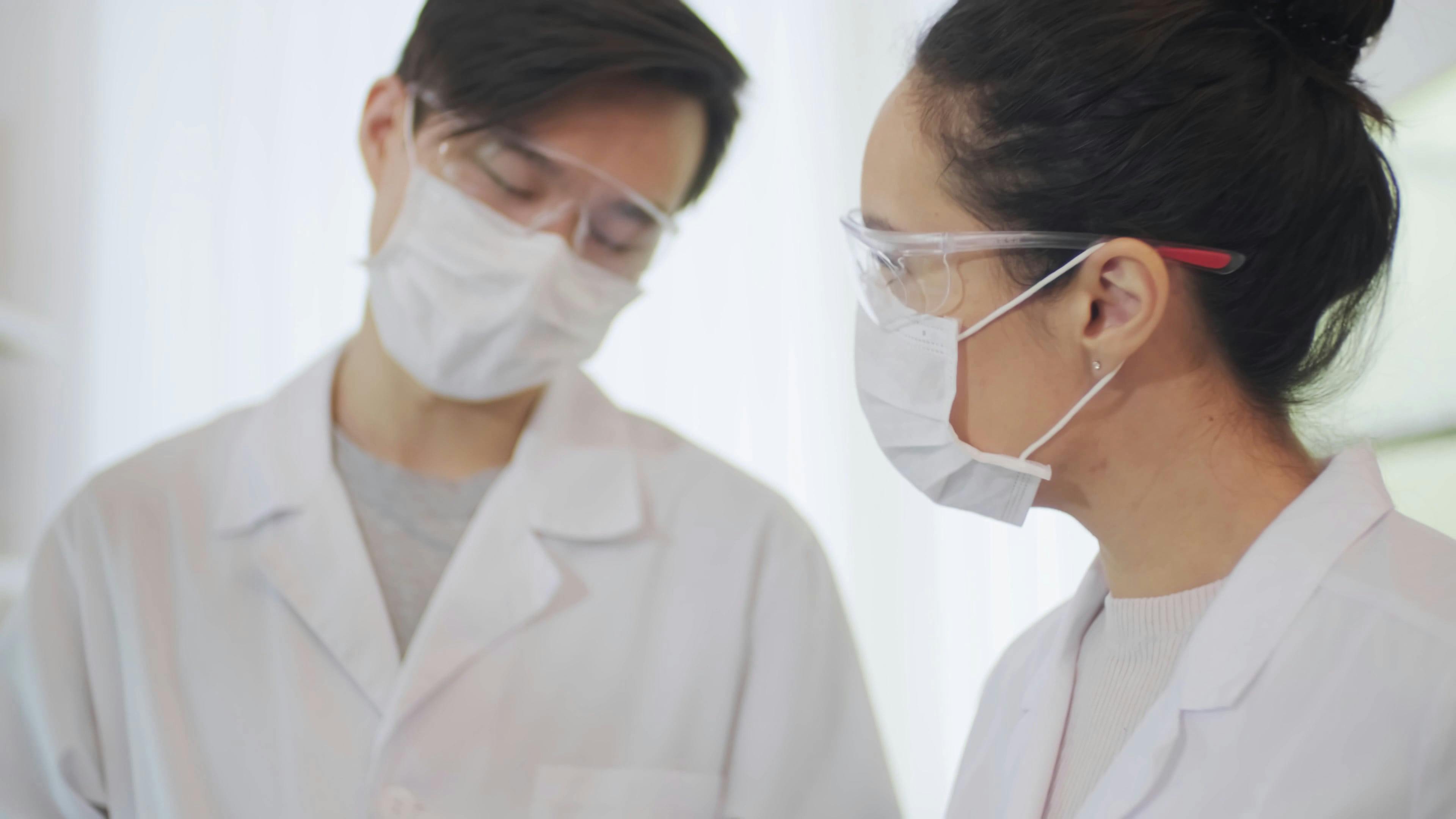 Scientists At Work Inside A Laboratory · Free Stock Video