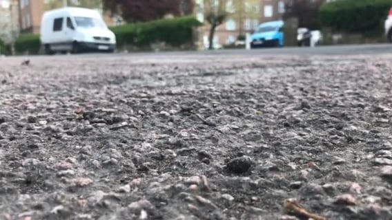 Ground Level Shot Of The Roadside Asphalt Pavement Free Stock Video ...