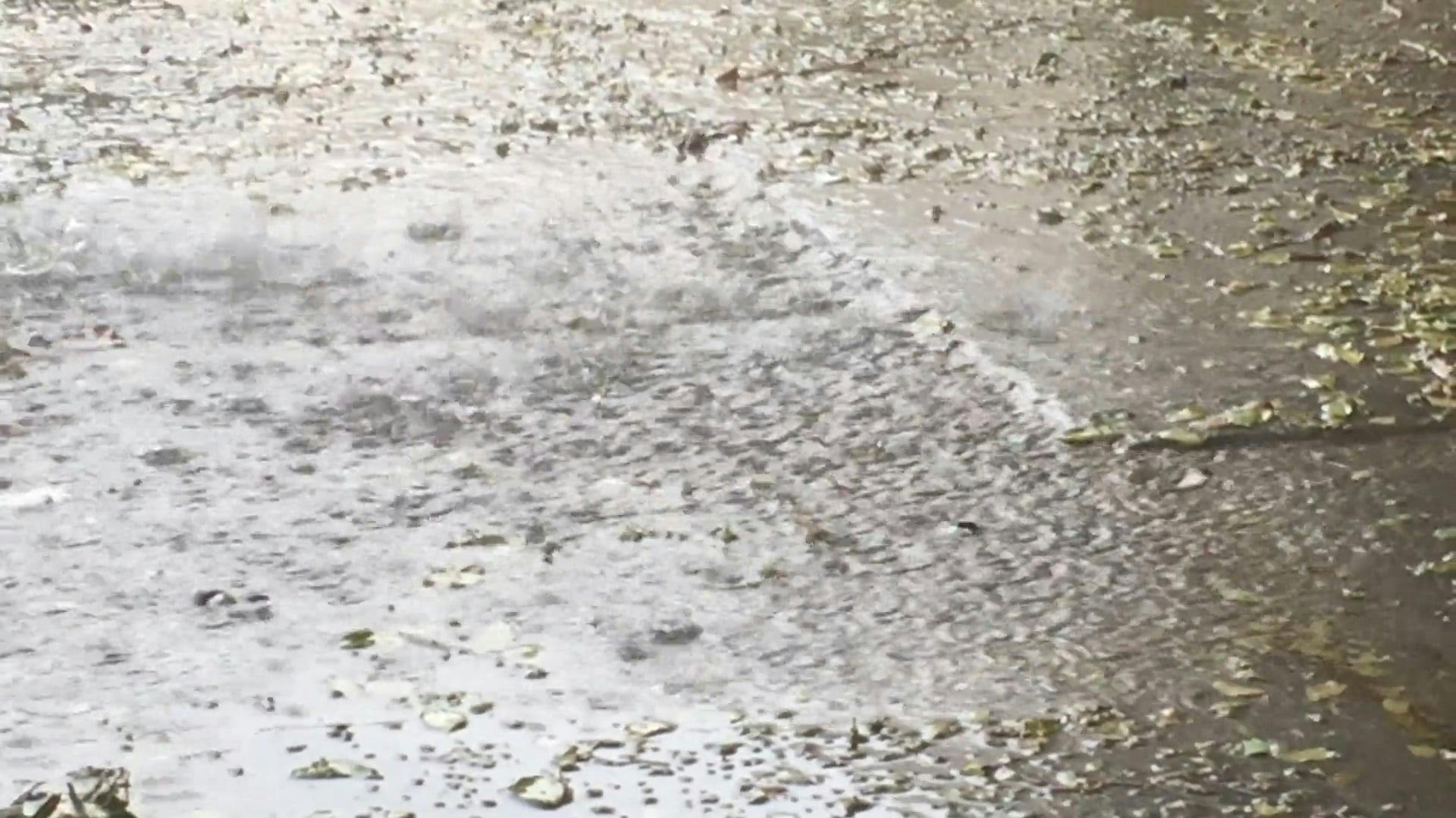 Rain Pouring on to a Concrete Pavement Free Stock Video Footage ...