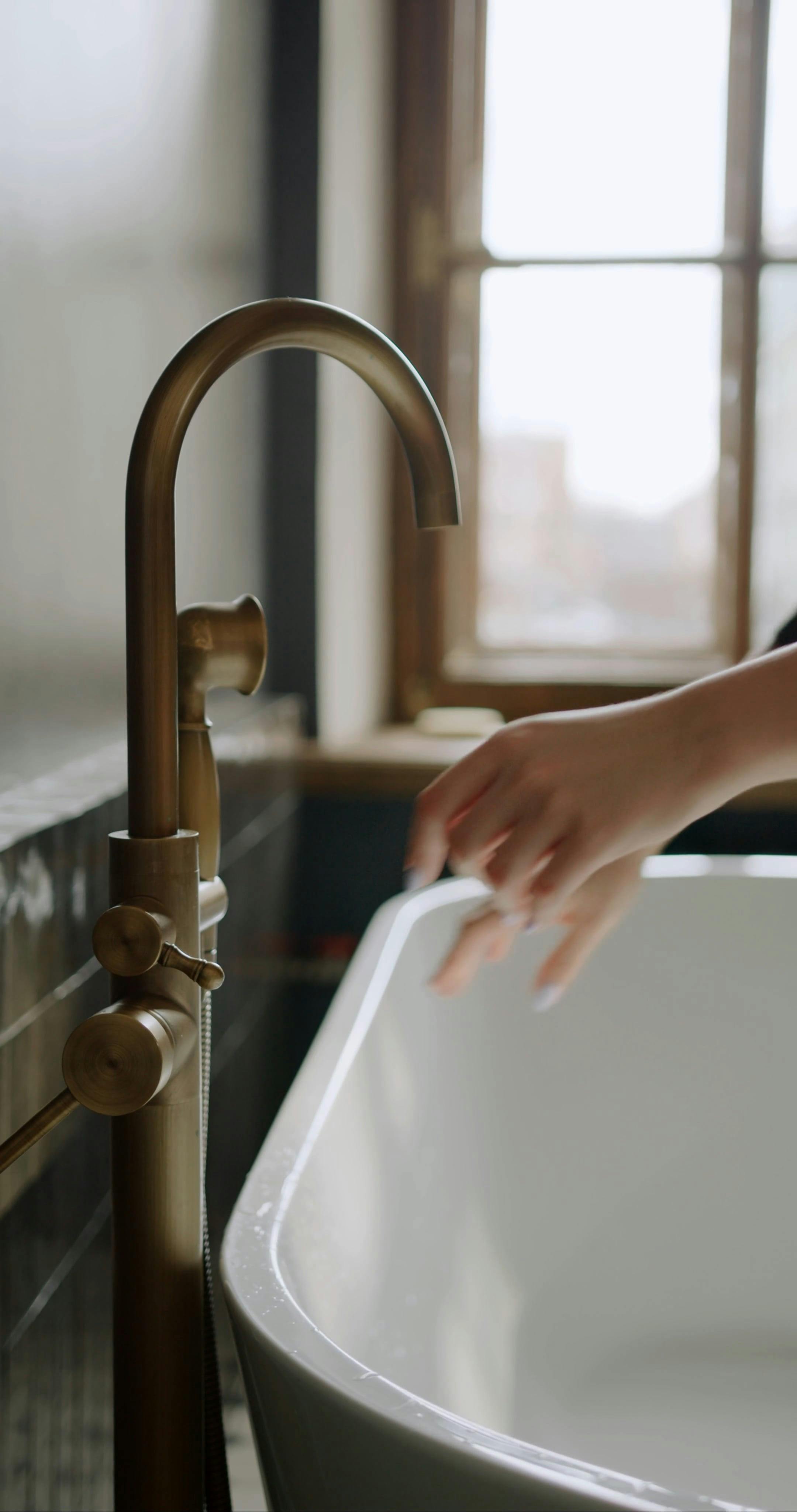 A Turn On Faucet Filling The Bath Tub With Water Free Stock Video ...