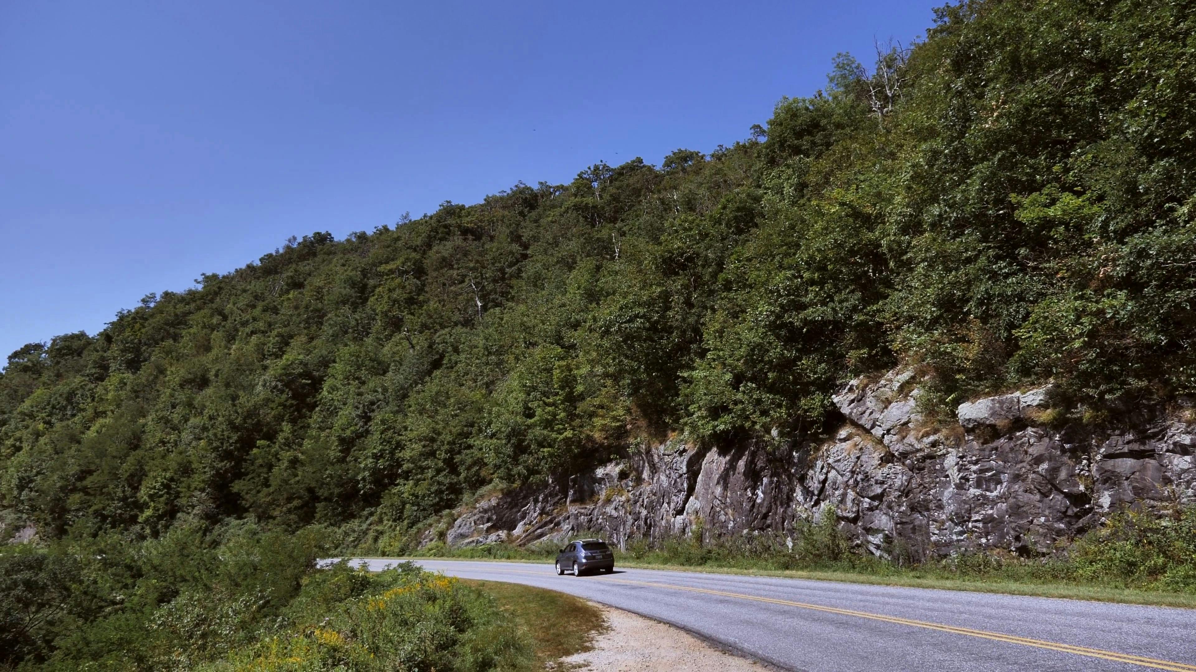 Drone Footage of a Mountain Ridgeline and Low Clouds Free Stock Video ...
