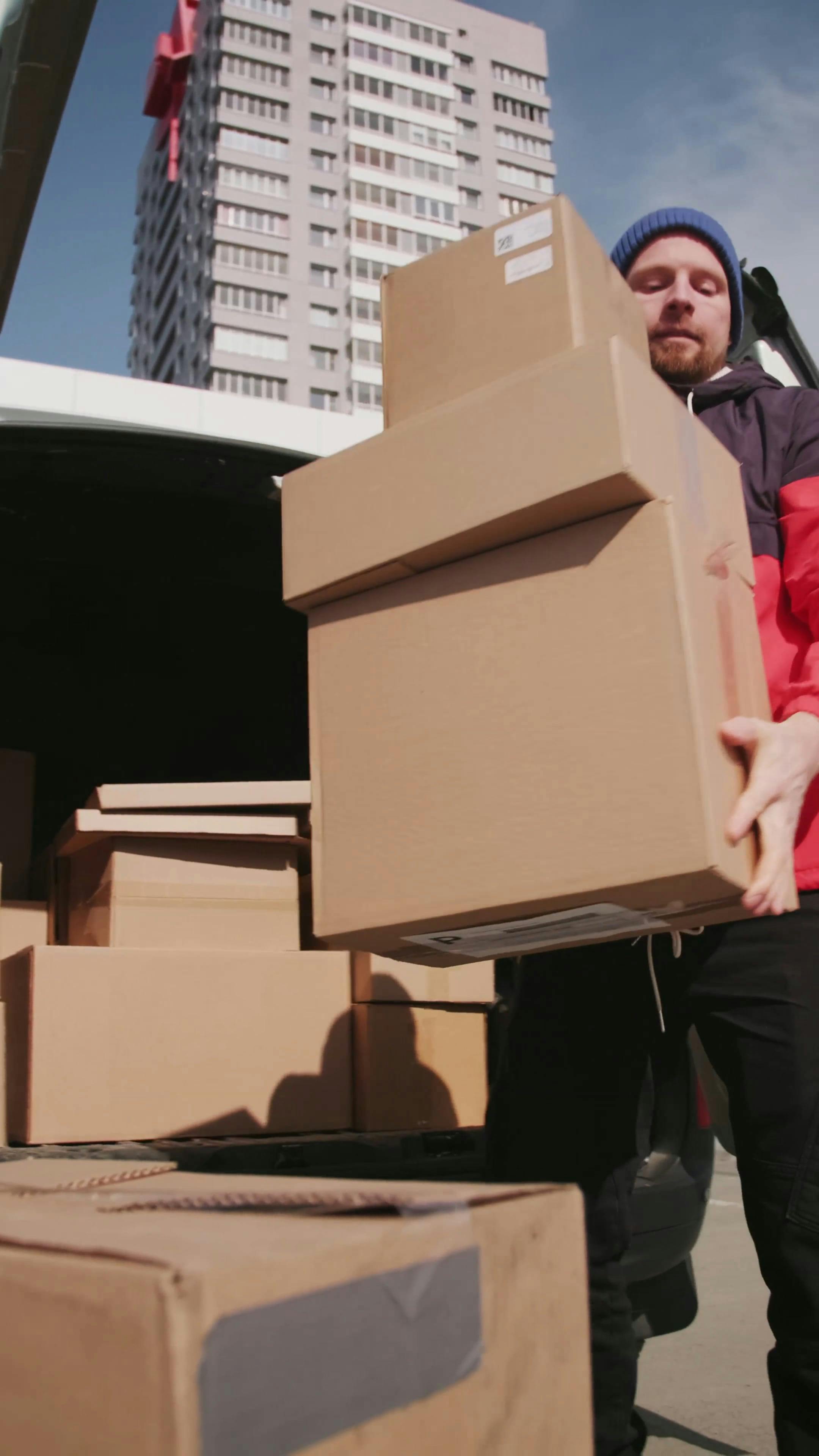 A Man Unloading Boxes from the Car Free Stock Video Footage, Royalty ...