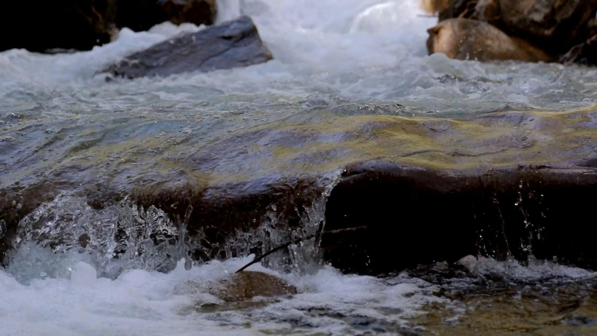 A River Stream Cascading Through Bed Of Rocks Free Stock Video Footage ...