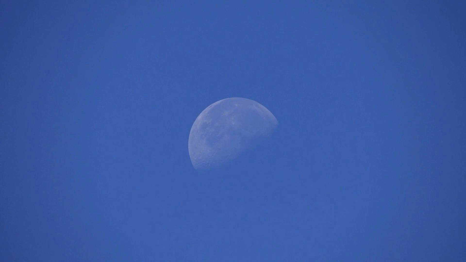 A Shot of the Moon on a Blue Night Sky Free Stock Video Footage ...