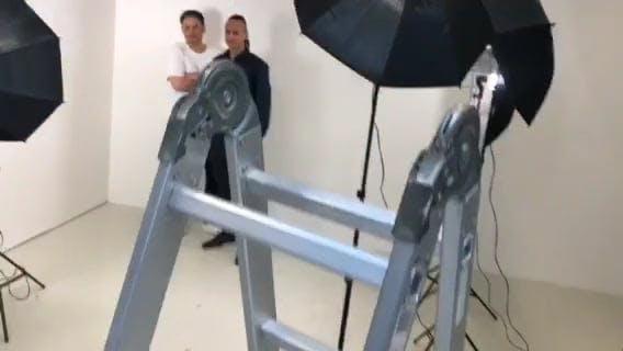 A Photo Shoot In Progress Inside A Studio · Free Stock Video