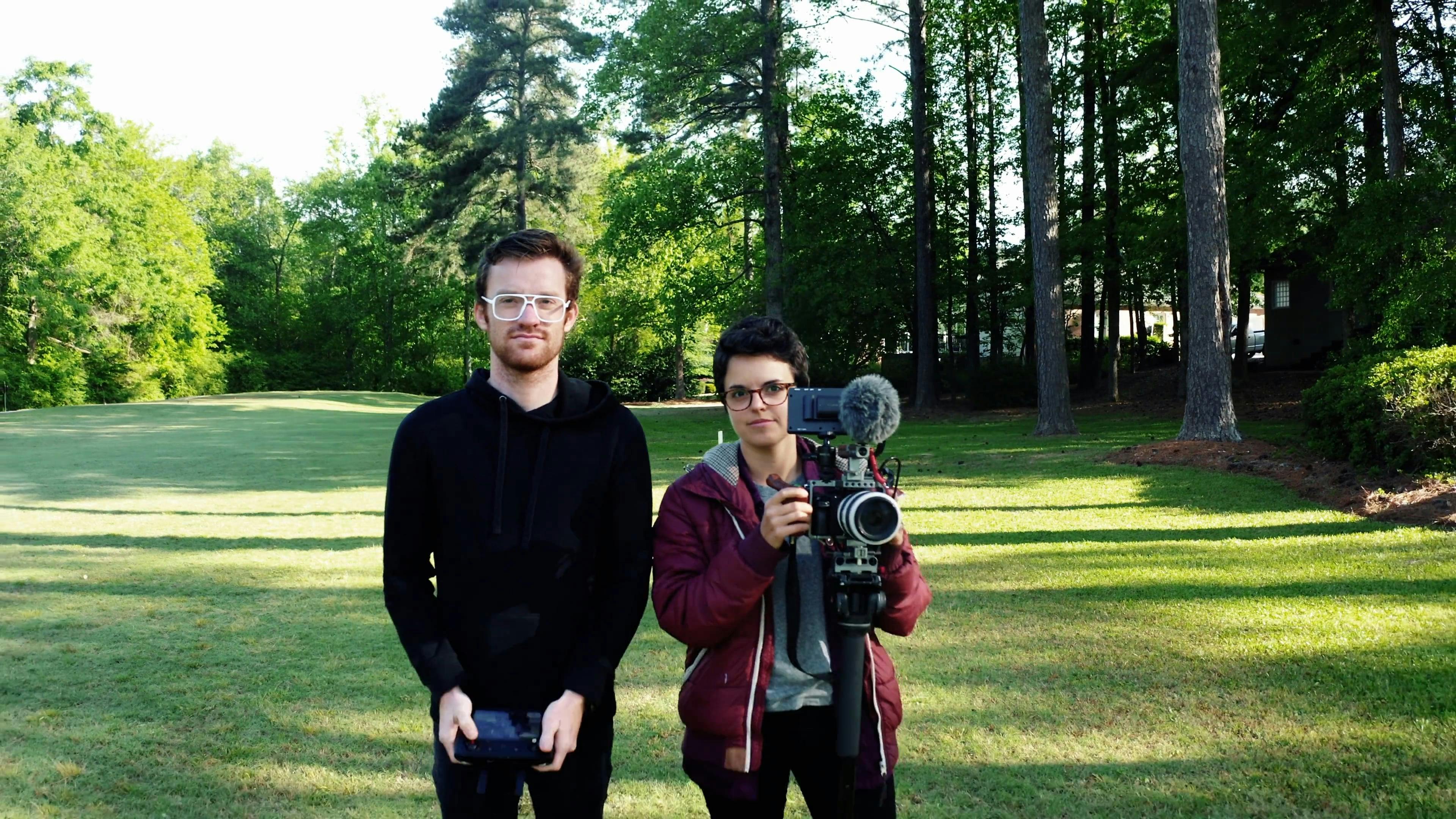 Pull-out shot of People Holding a Camera Free Stock Video Footage ...