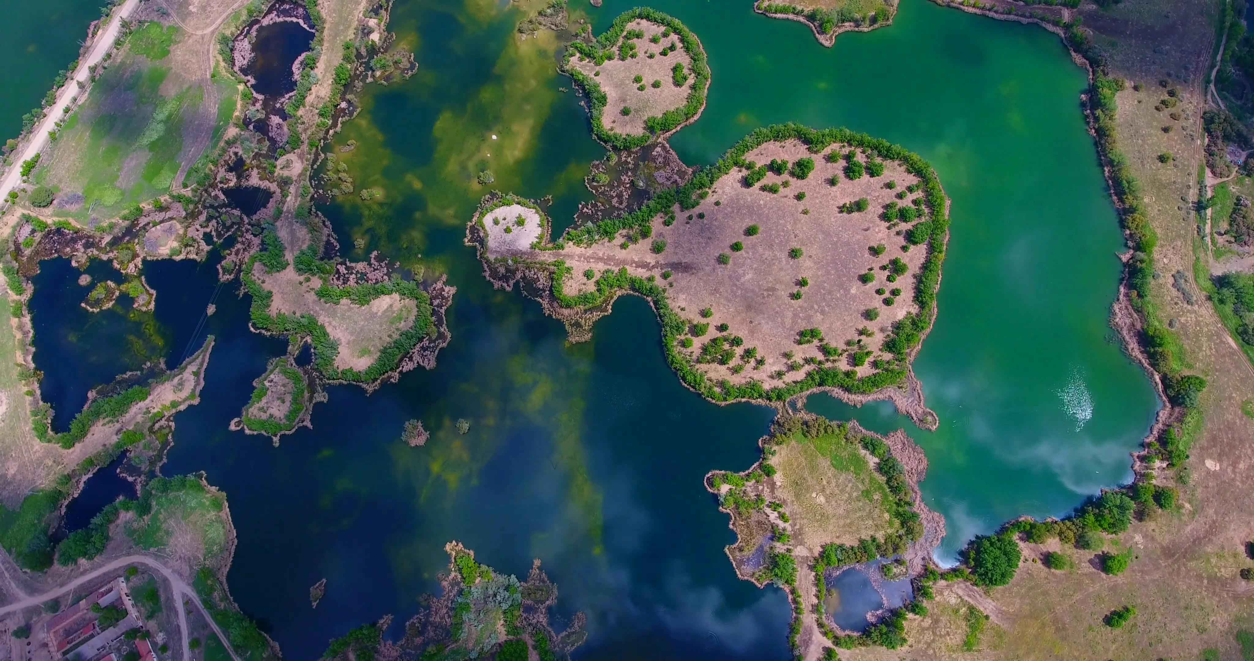 Aerial View Of Islands And Islets Rising Above The Lake · Free Stock Video