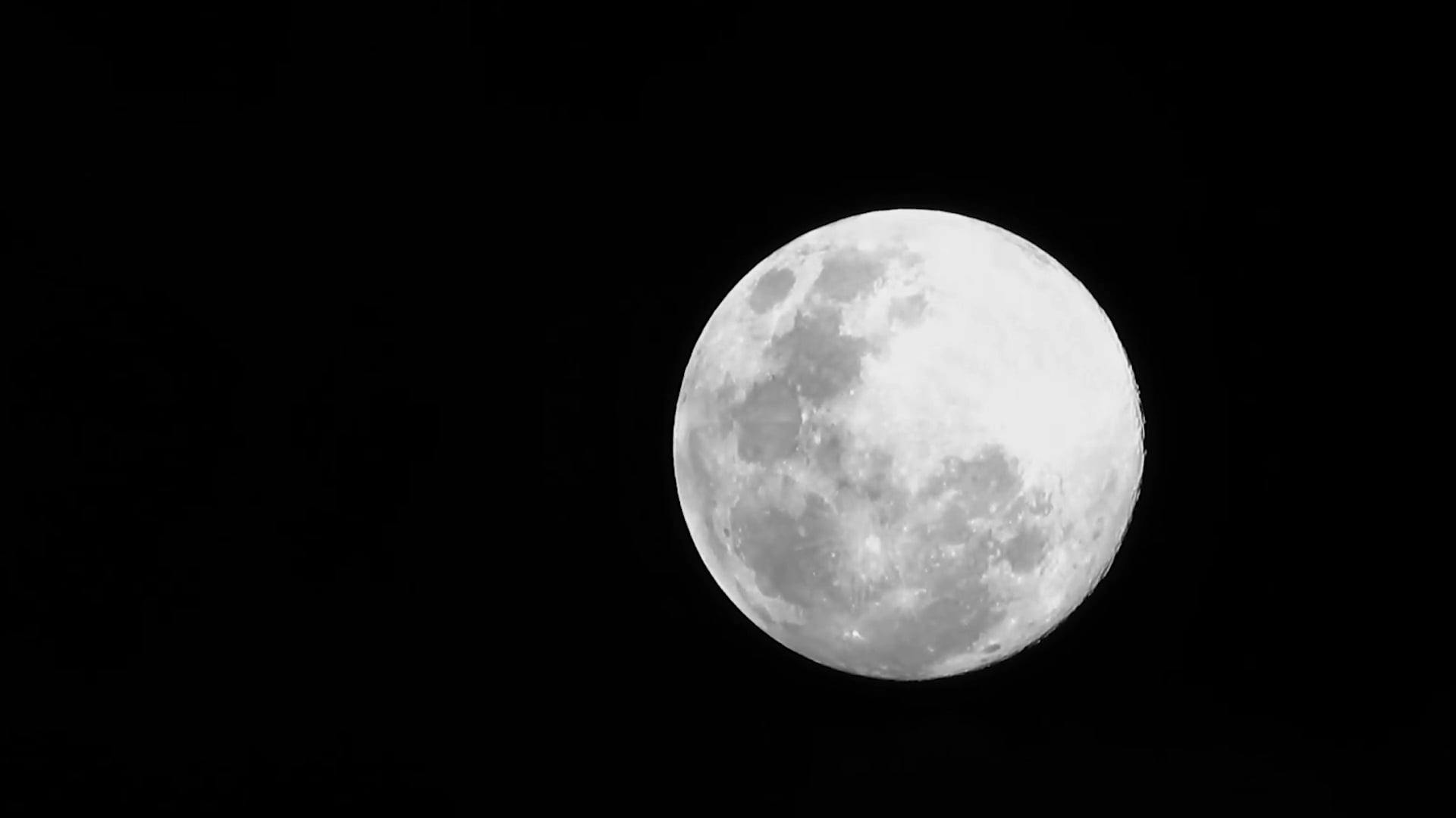 Beautiful Moon Rises through Night Clouds · Free Stock Video