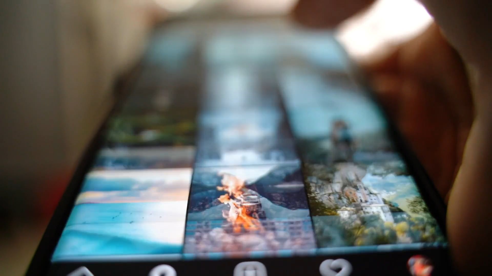 Scrolling Stored Photos On A Cellular Phone · Free Stock Video