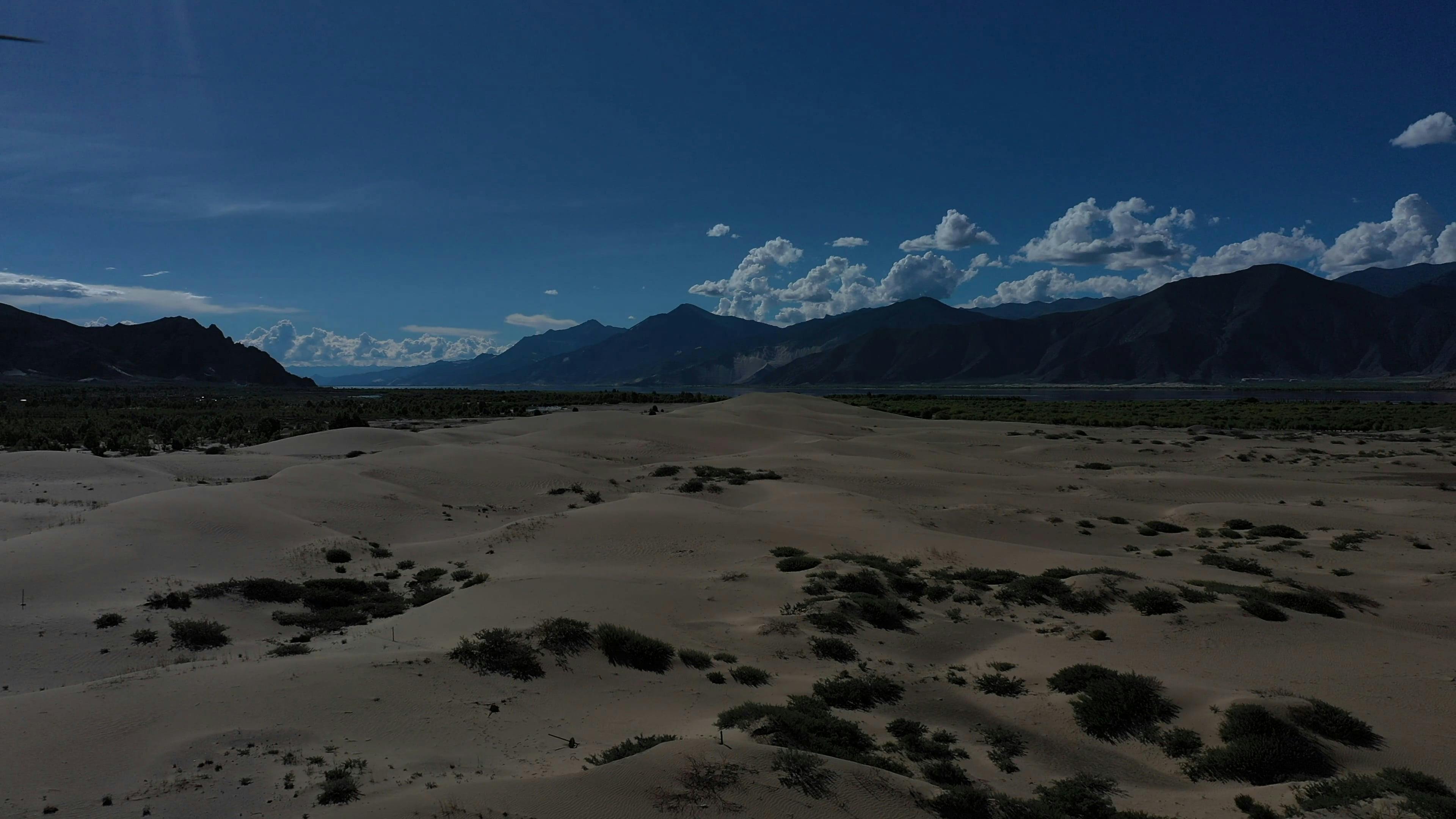 Drone Footage Of Sand Dunes Near A Lake · Free Stock Video