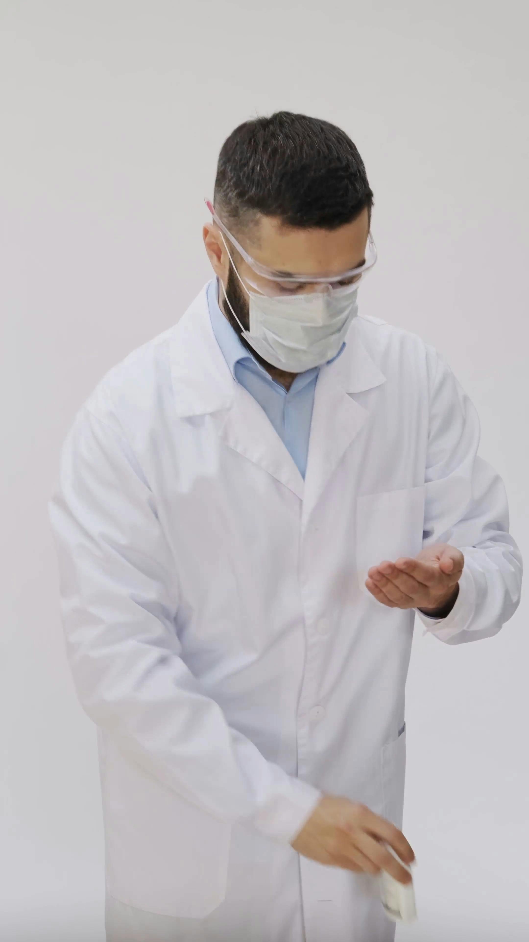 Doctor Spraying Alcohol In His Hands For Protection Free Stock Video ...