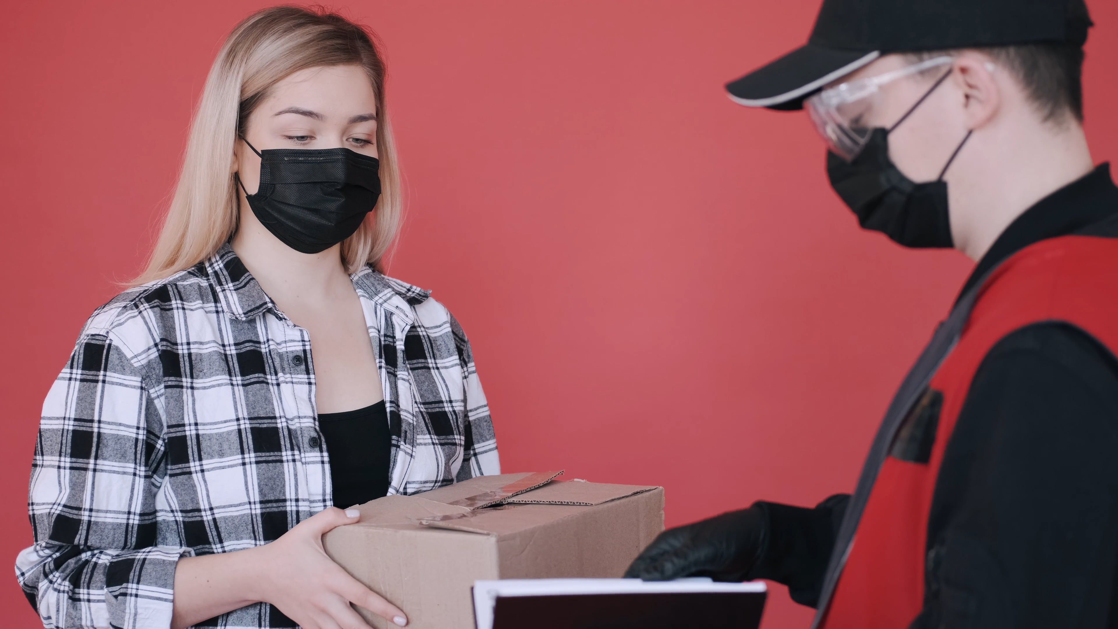Woman With Face Mask Receiving a Package Free Stock Video Footage ...