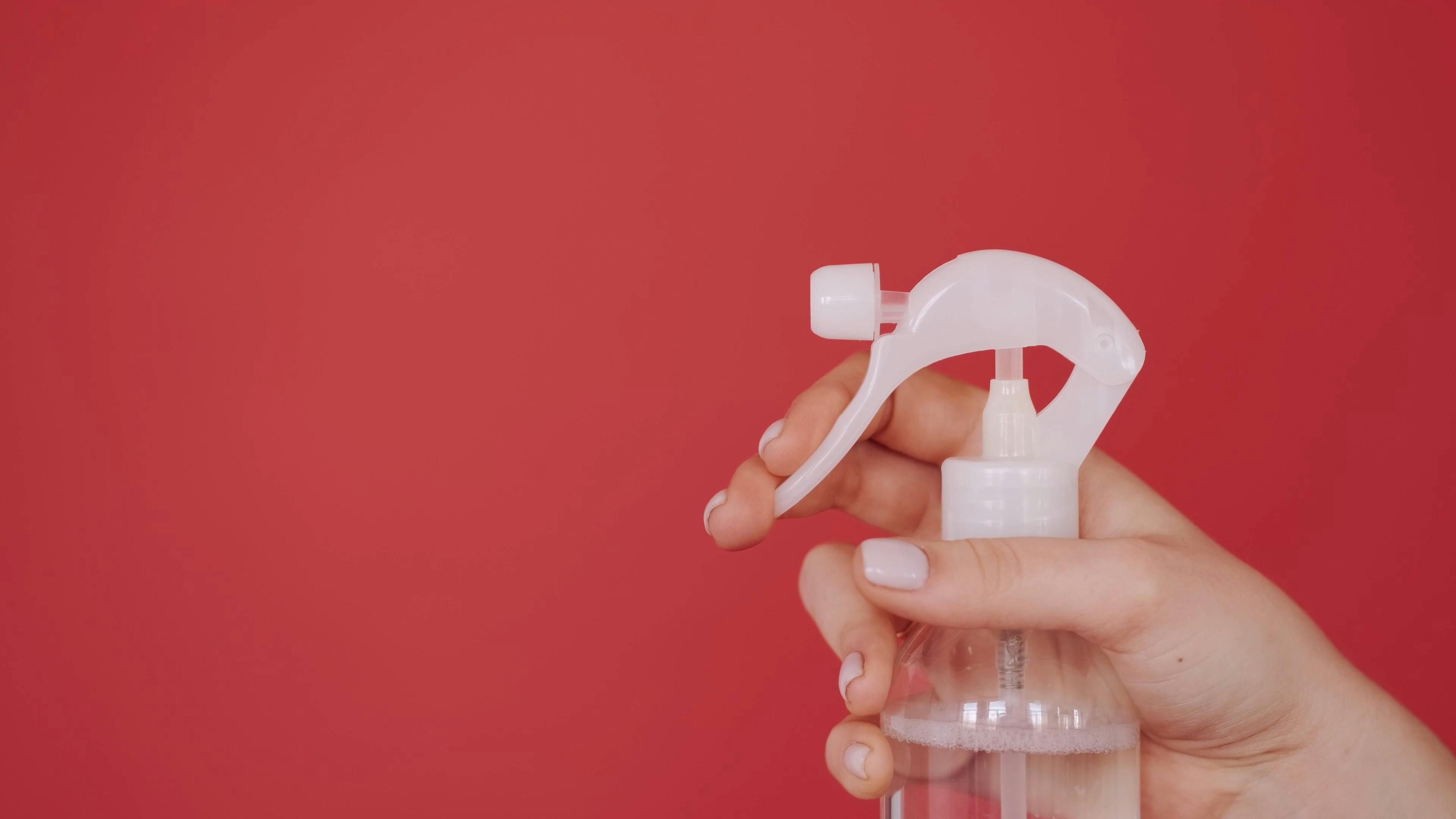 Hand Using an Atomizer · Free Stock Video