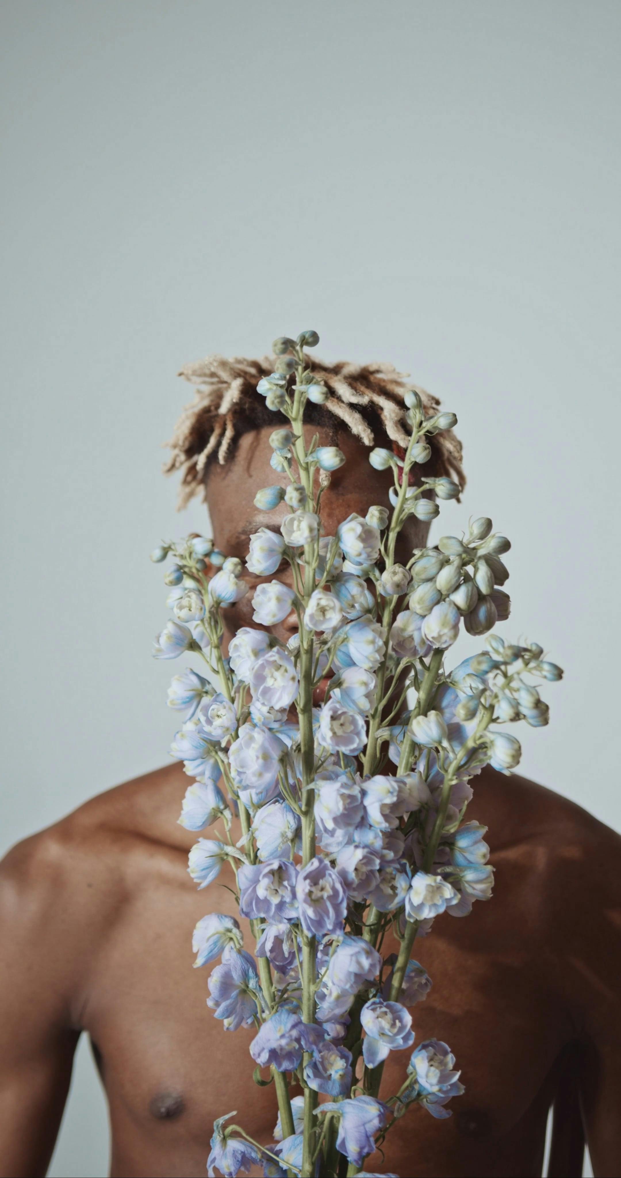 A Man Covers His Face With Flowers Free Stock Video Footage, Royalty ...