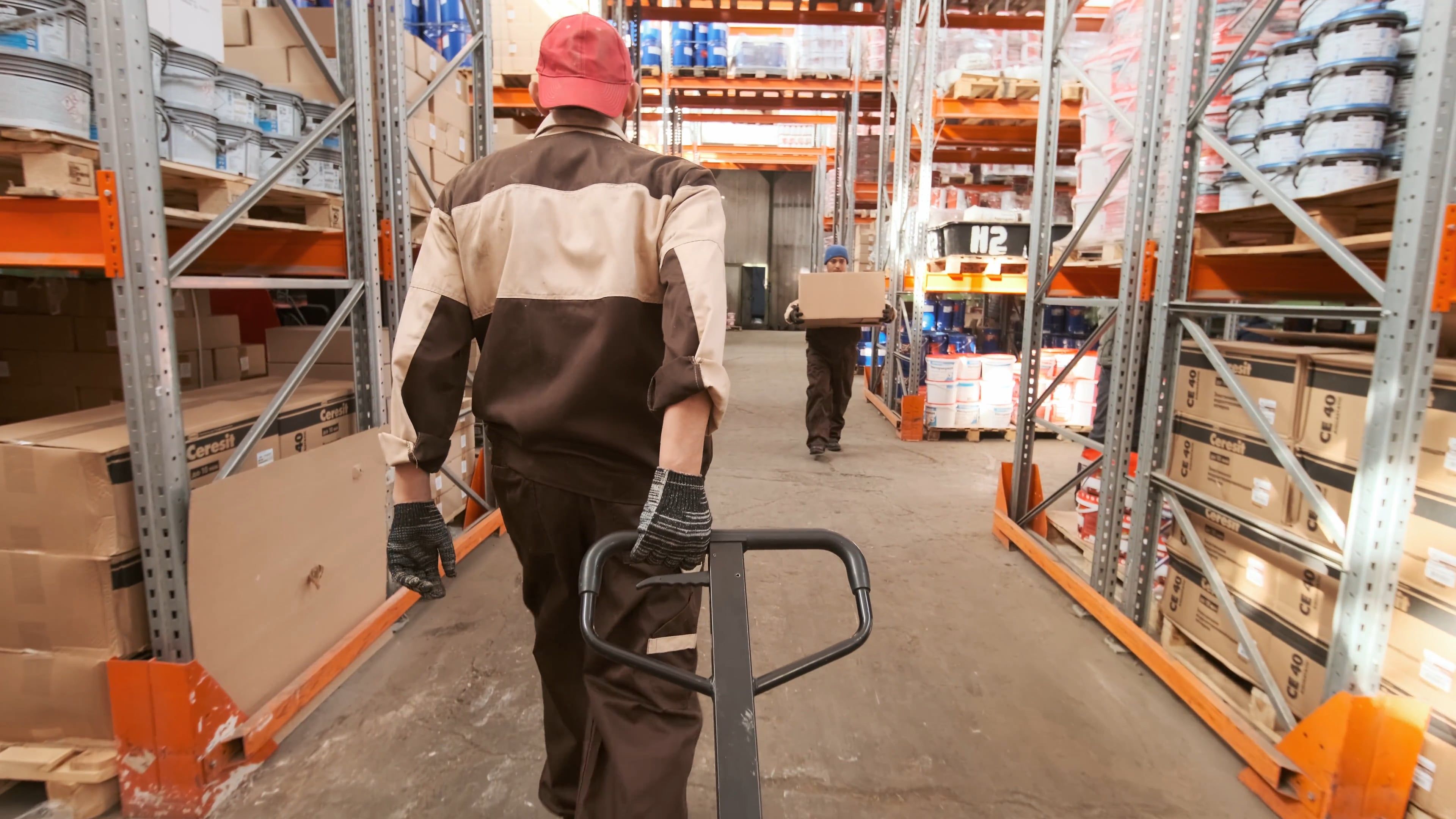 A Man Dragging a Pallet Cart · Free Stock Video