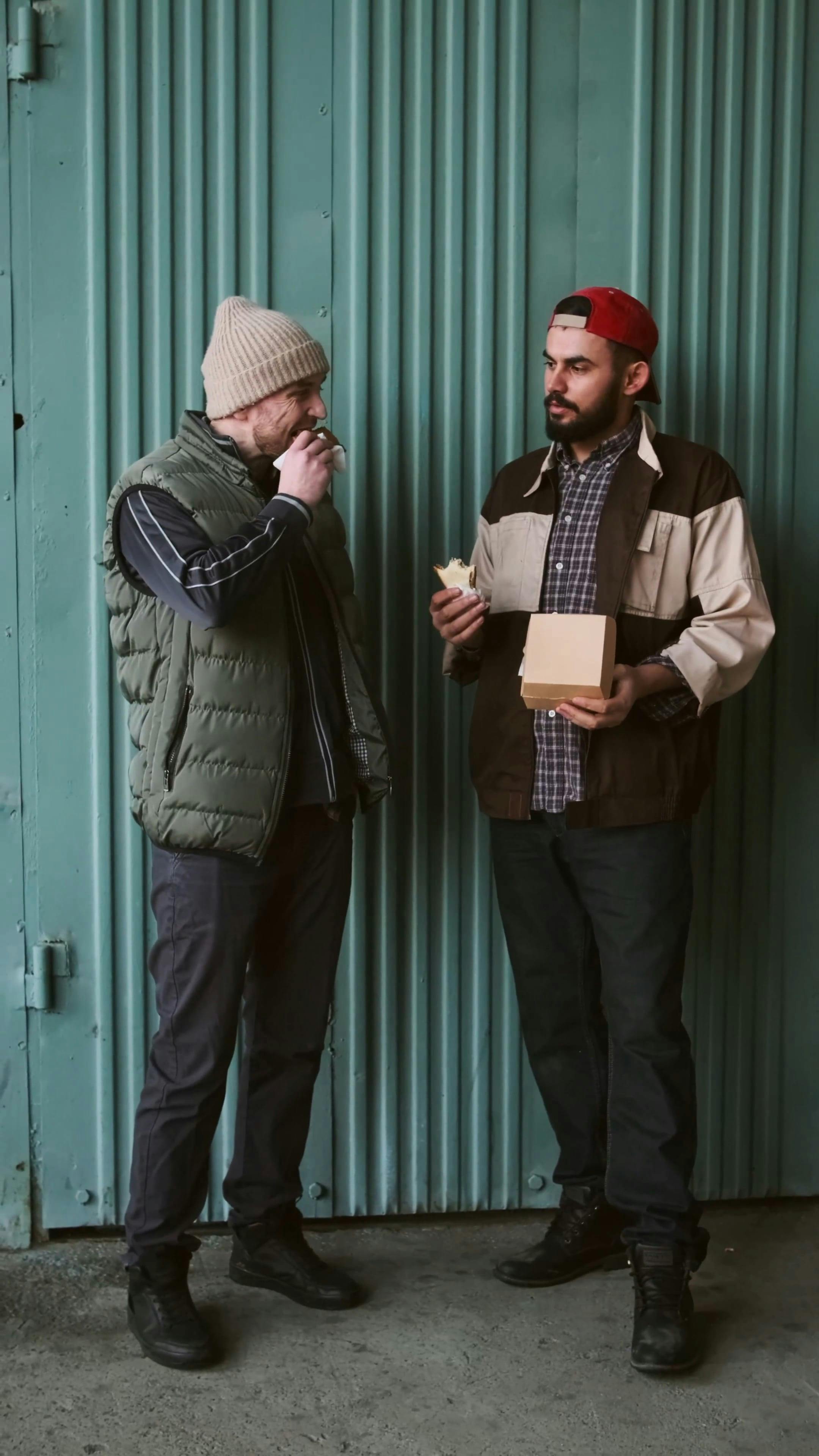 Two Men Having A Lunch Break At Work · Free Stock Video