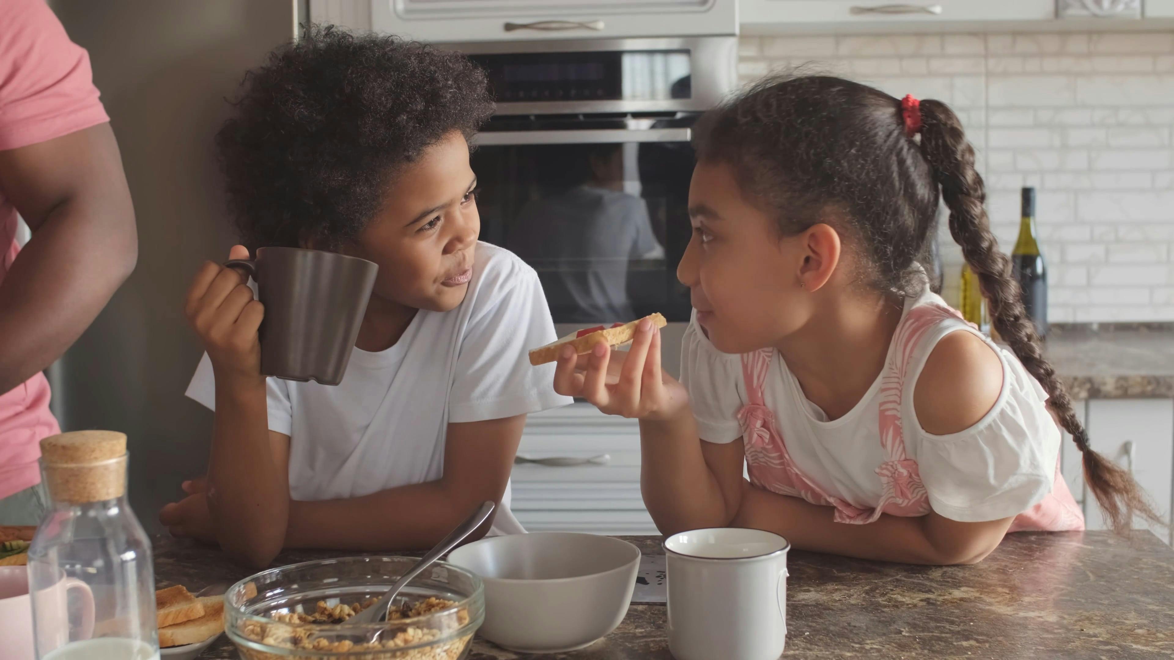 A Kid Watching While Eating Breakfast Free Stock Video Footage, Royalty ...