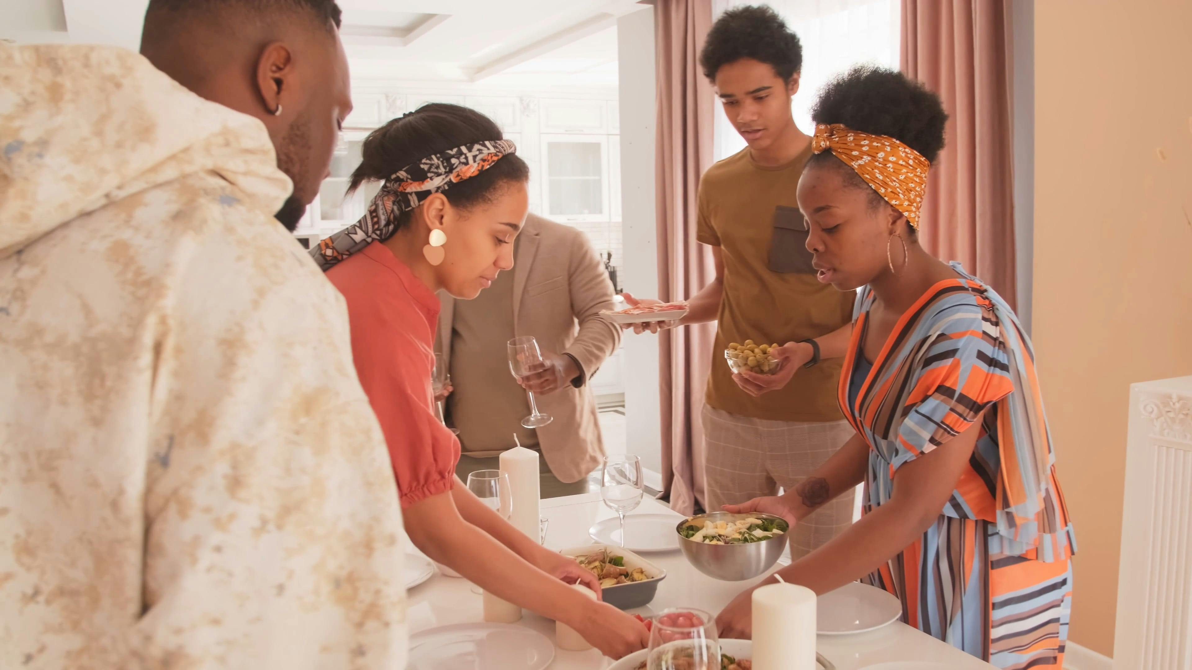 Family Sets the Food on the Dining Table Free Stock Video Footage ...