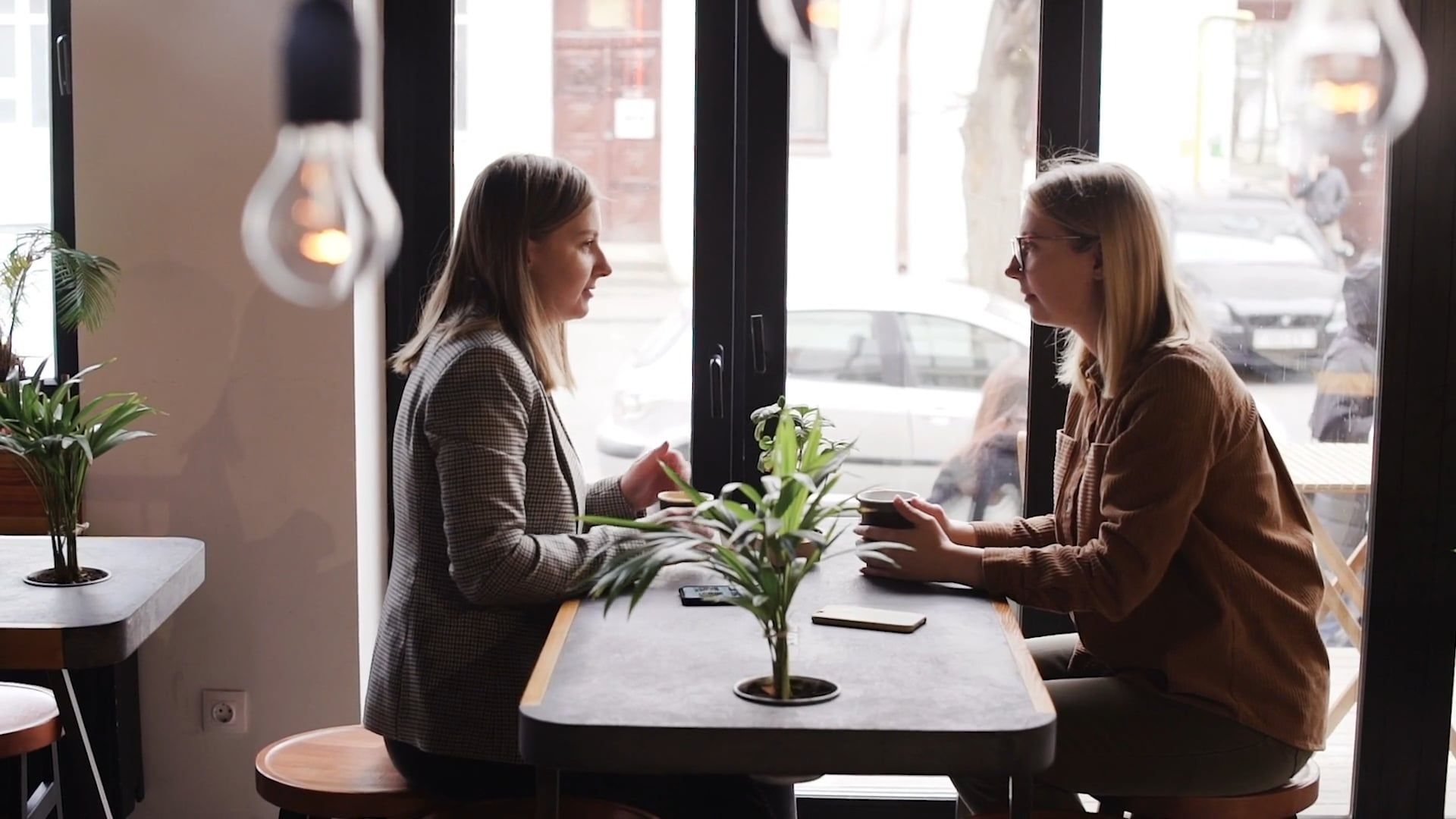 women-having-a-conversation-while-having-coffee Free Stock Video ...