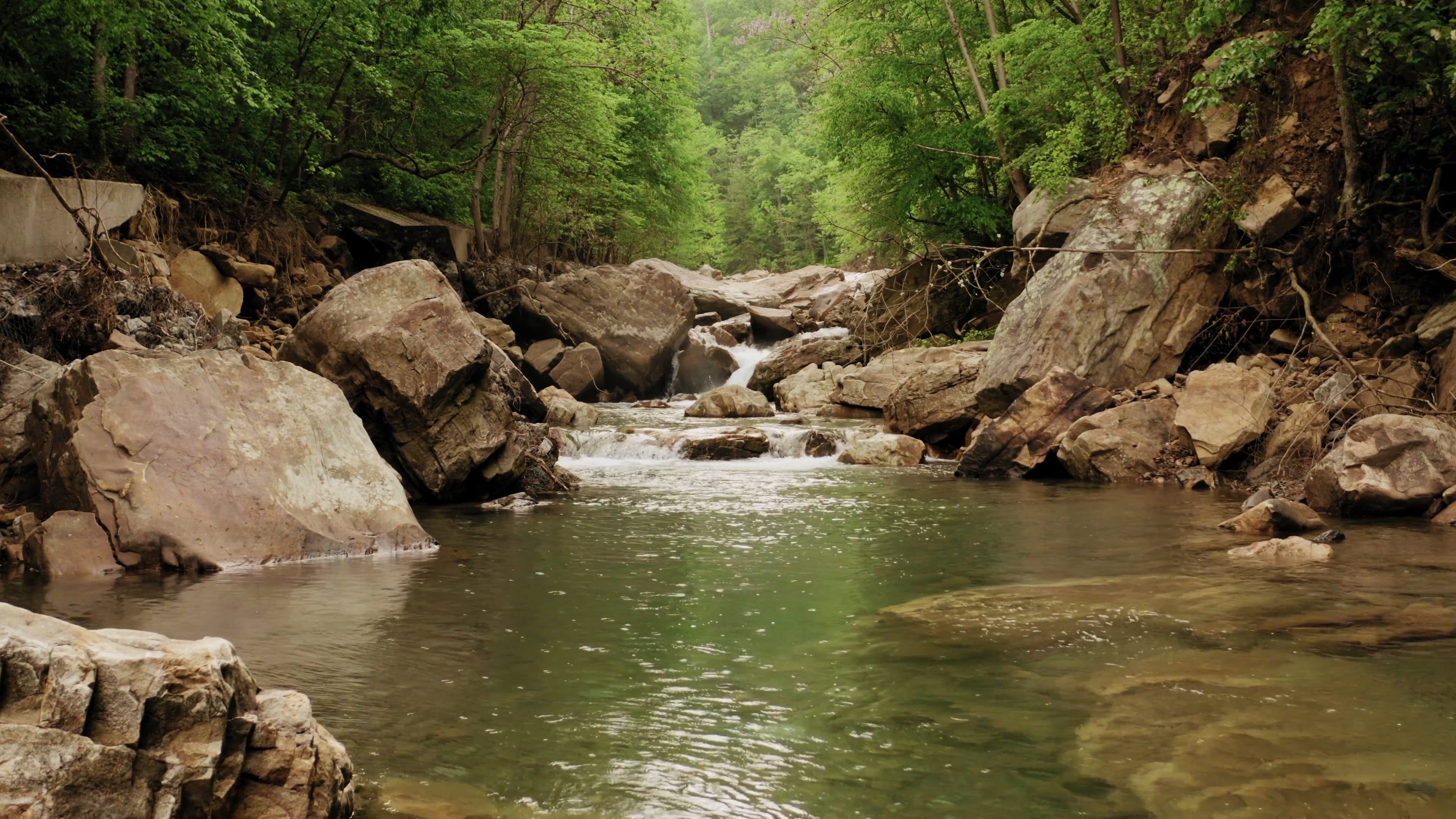 A Drone Shot Over a Rocky River · Free Stock Video