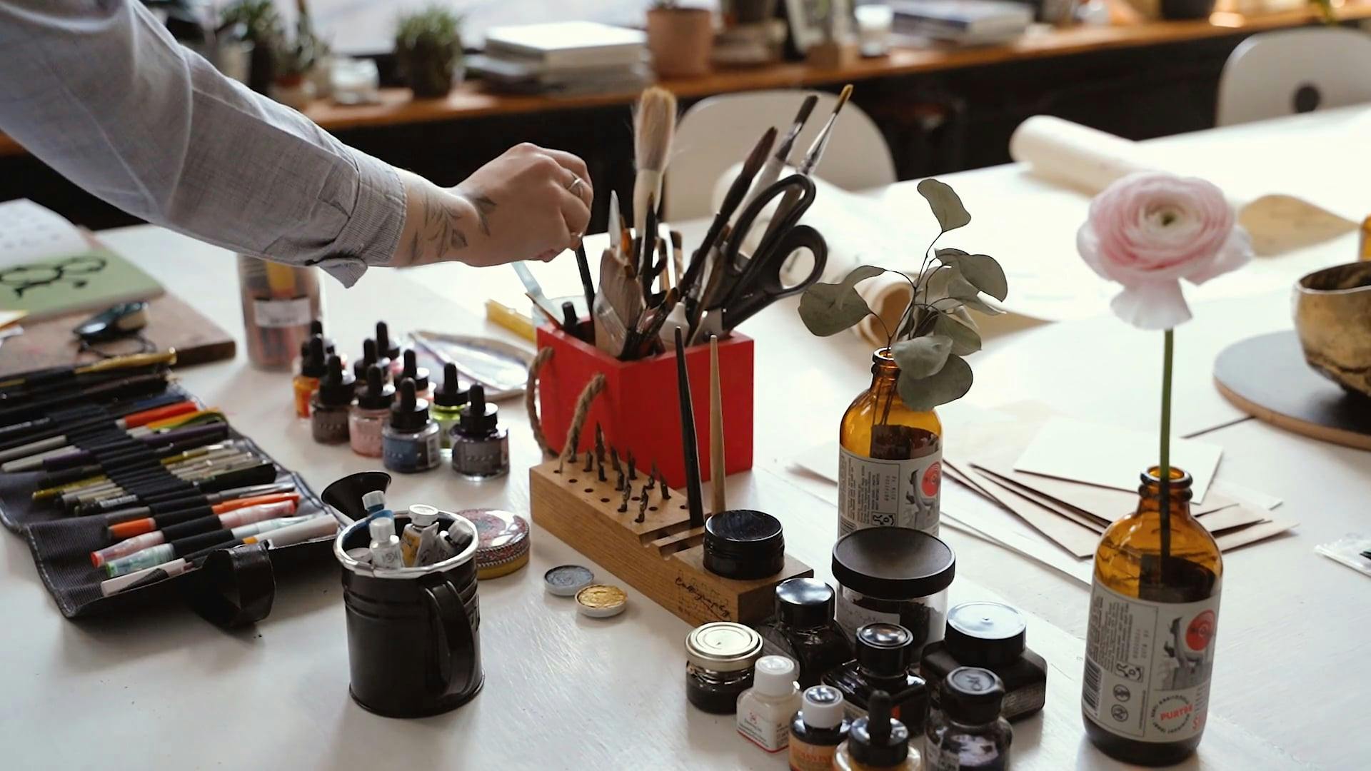 A Close Up Shot of a Woman Doing Calligraphy · Free Stock Video