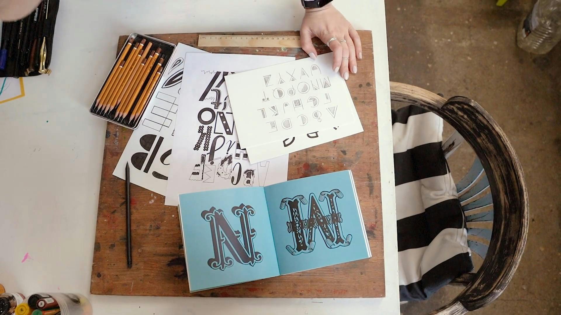 A Close Up Shot of a Woman Doing Calligraphy · Free Stock Video