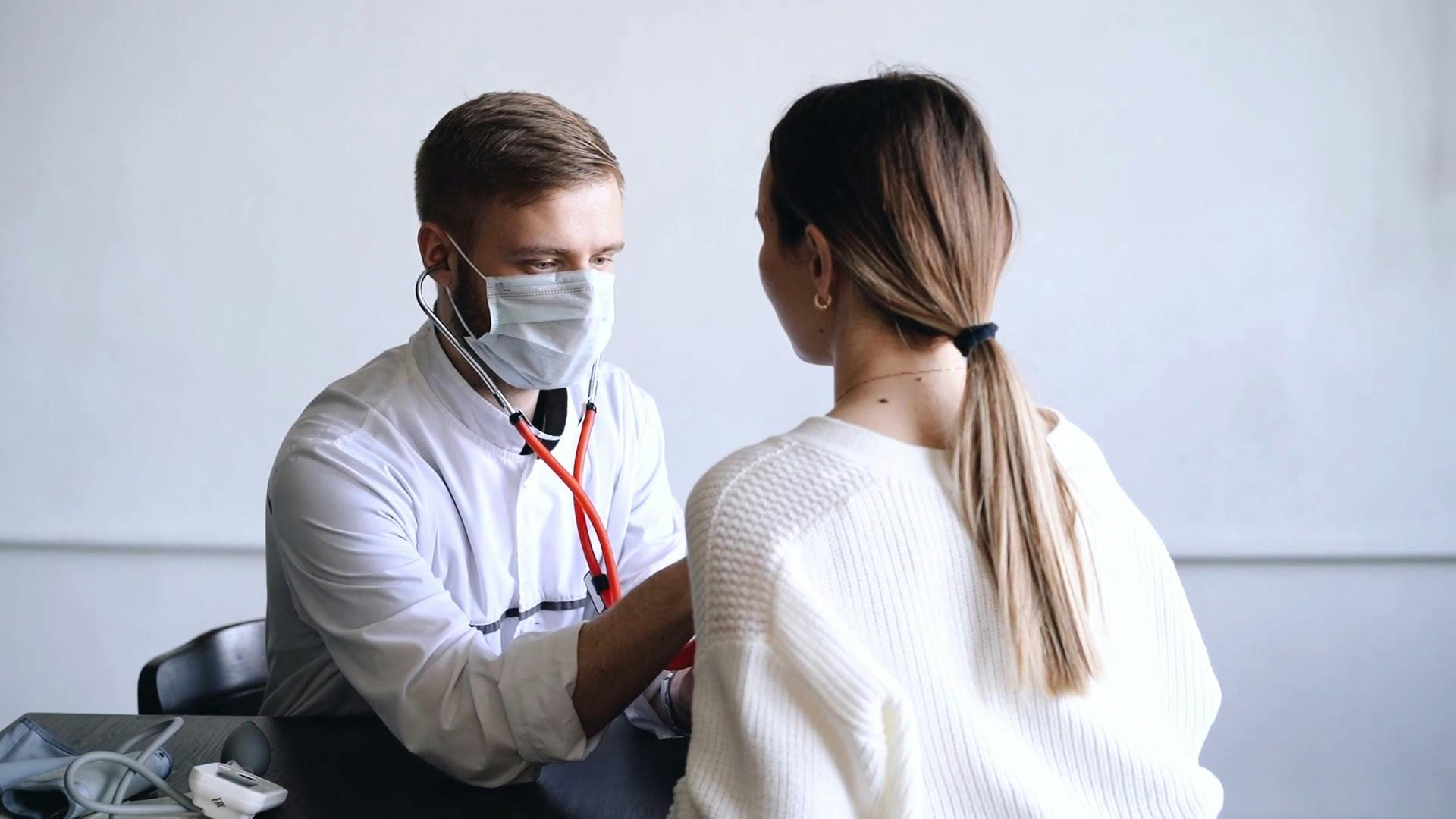 A Doctor Checking on a Patient's Breathing · Free Stock Video