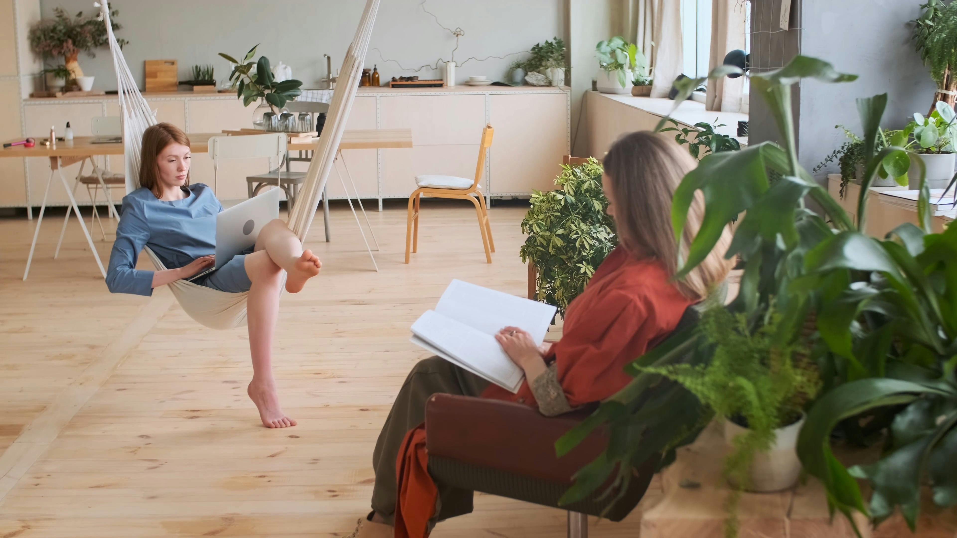 Two Women Keeping Themselves Busy While Staying At Home · Free Stock Video