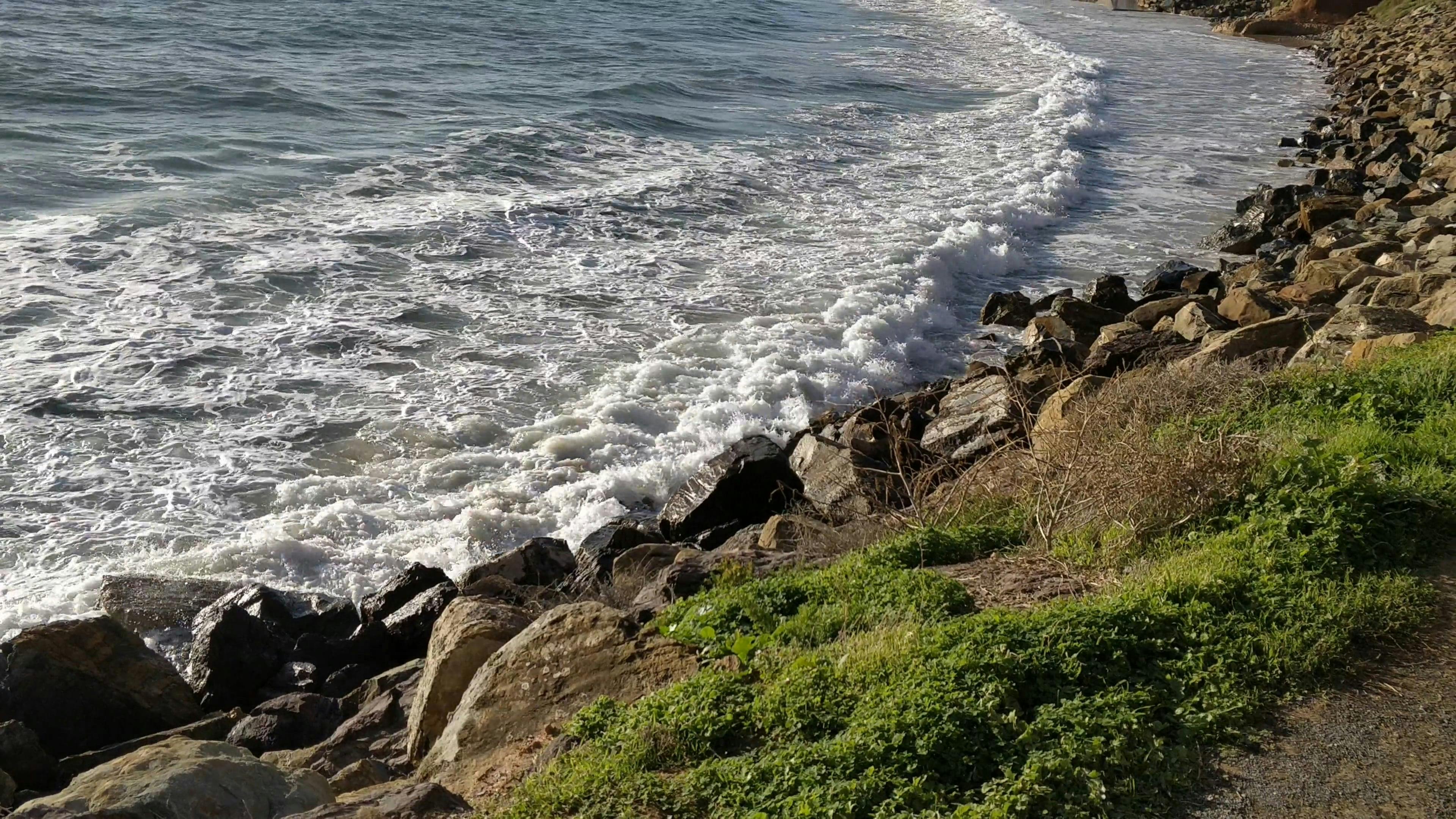 Pile Of Rocks Formed As Seawall · Free Stock Video