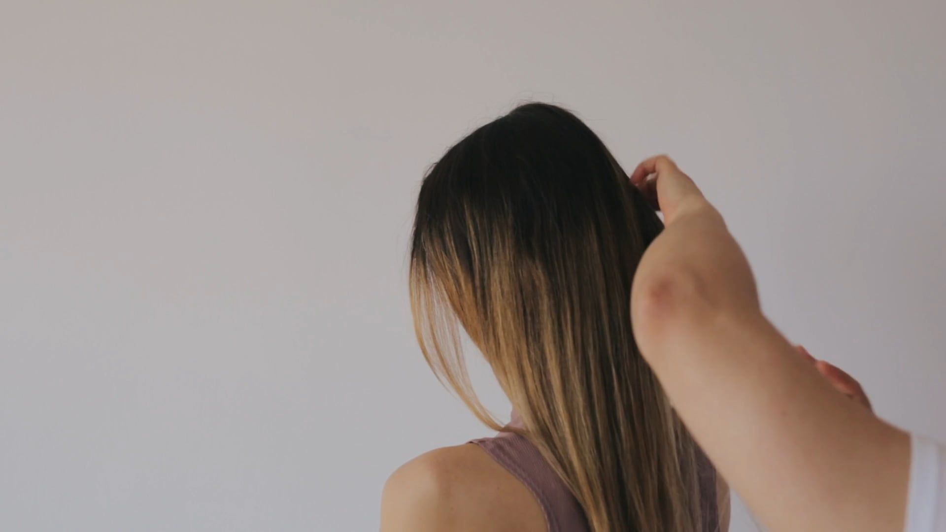 A Woman Fixing her Hair · Free Stock Video