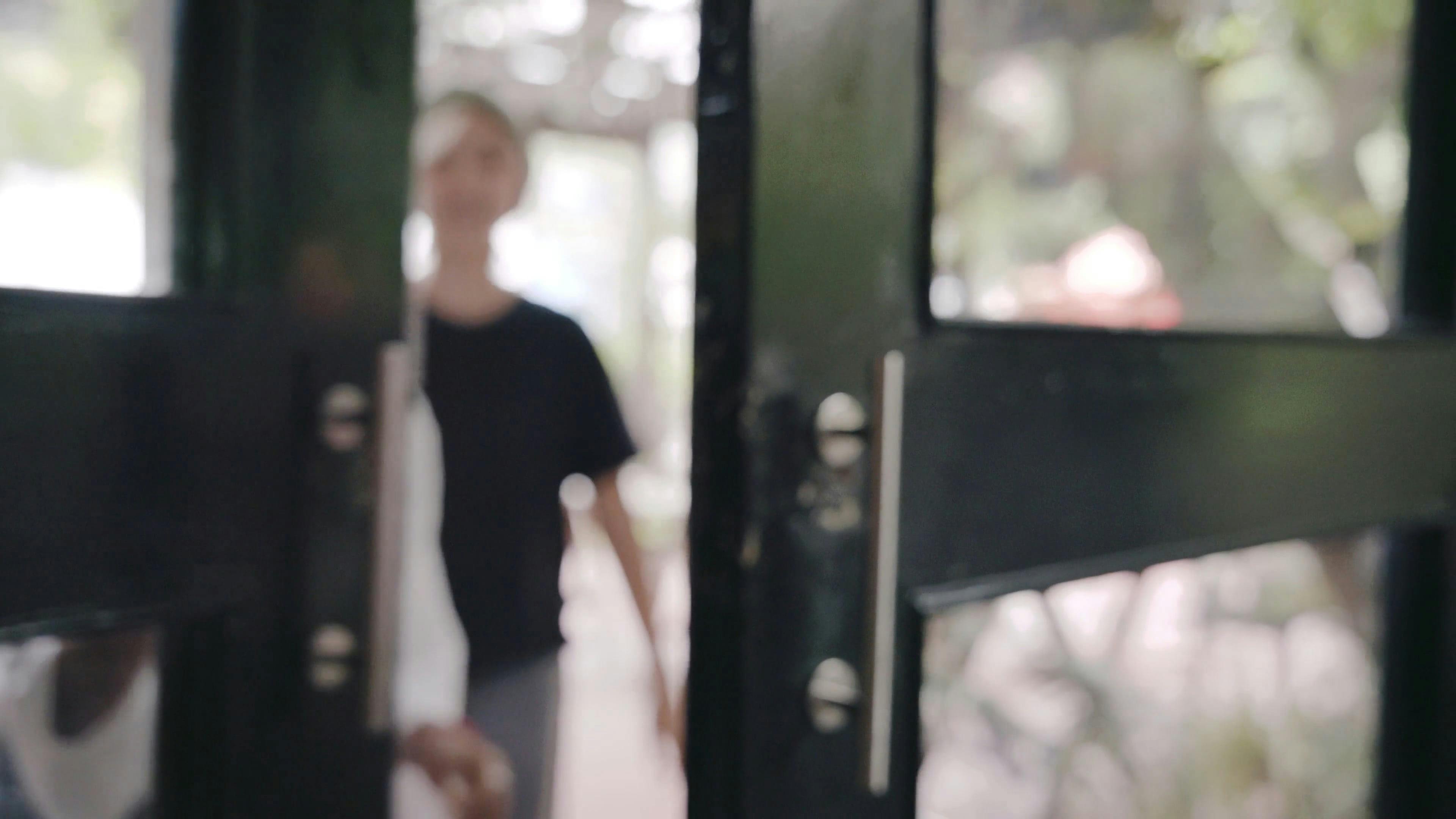 Two Women Entering A Door · Free Stock Video