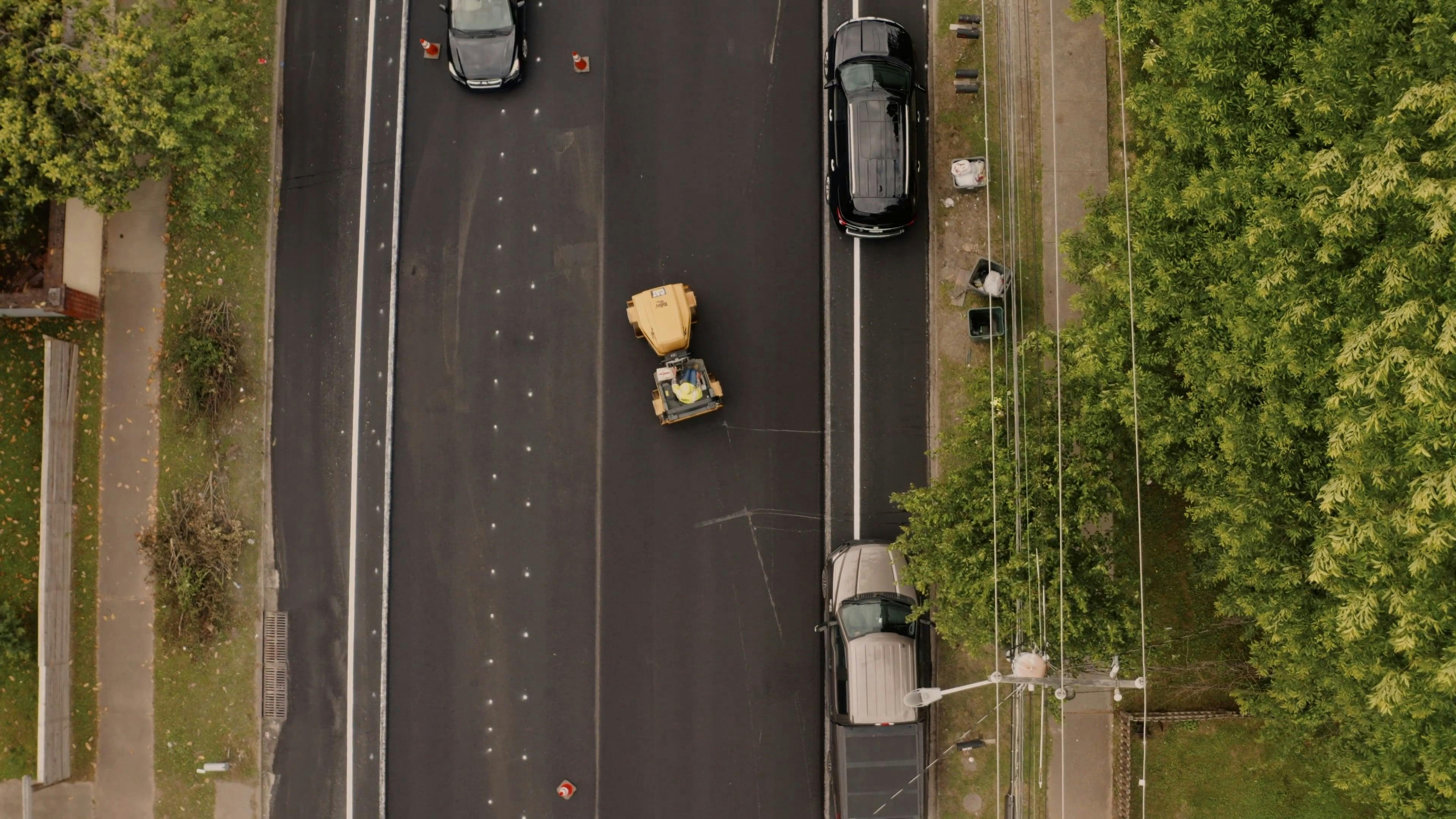 A Person Doing Road Maintenance · Free Stock Video