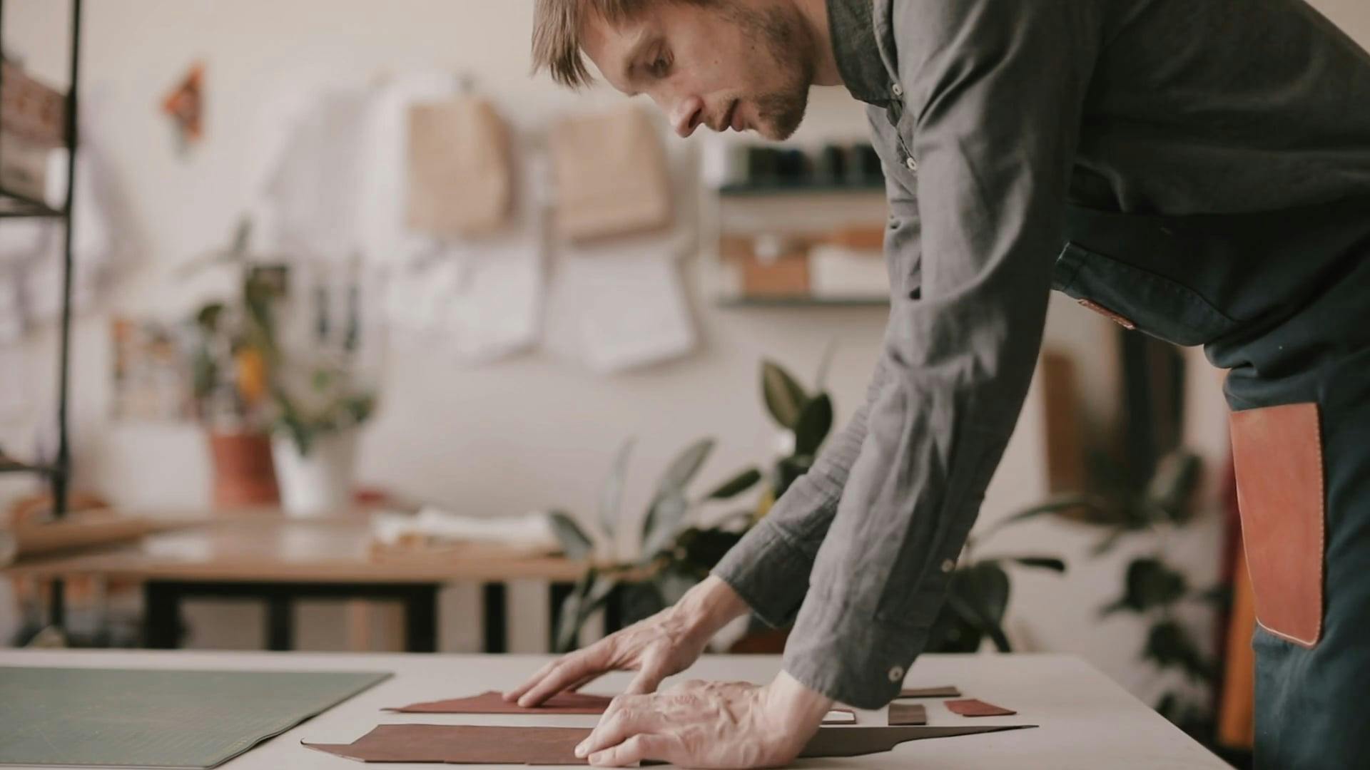 Man Assembling The Paper Piece on Leather Free Stock Video Footage ...