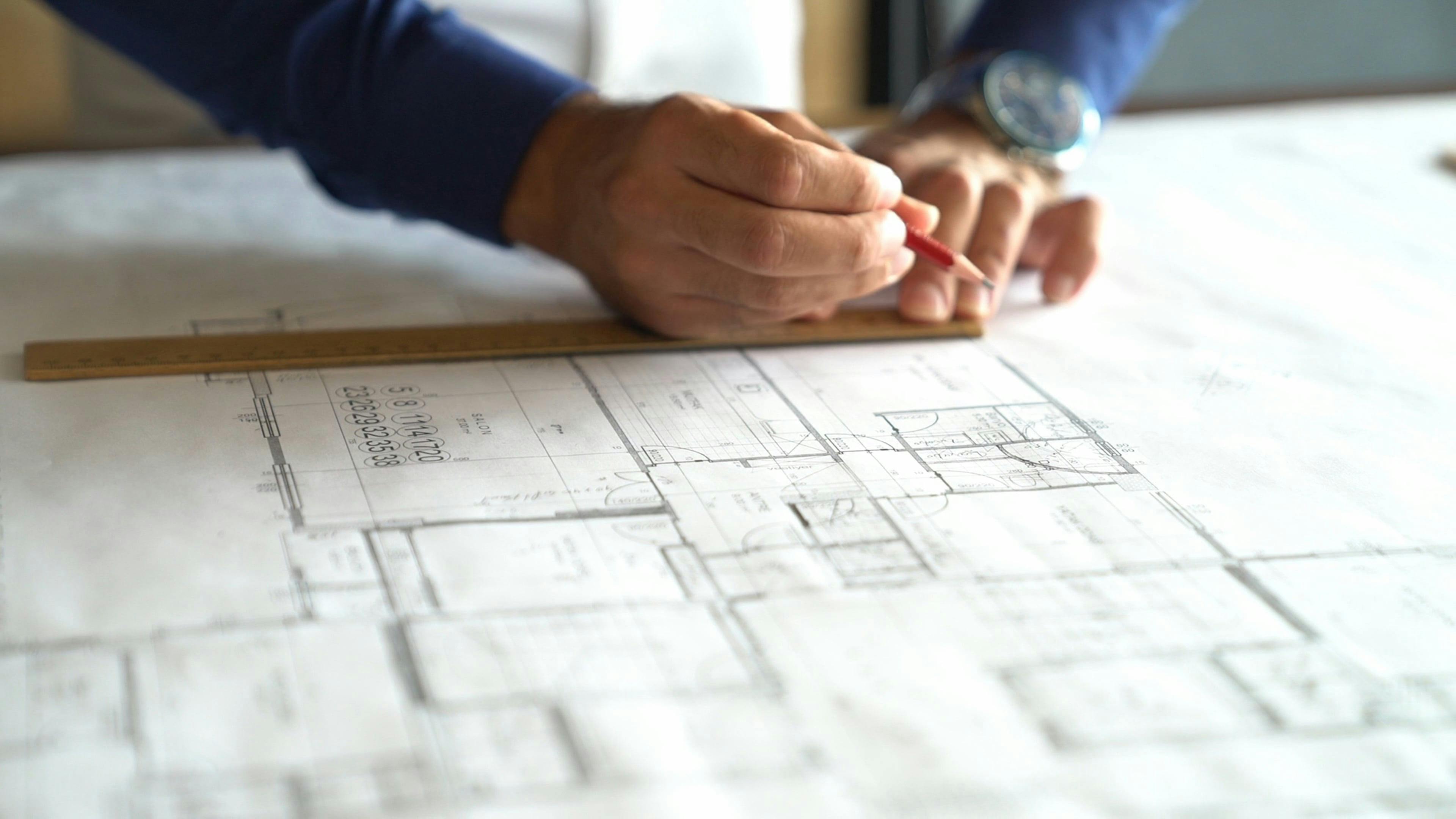 A Person Making a Blueprint · Free Stock Video