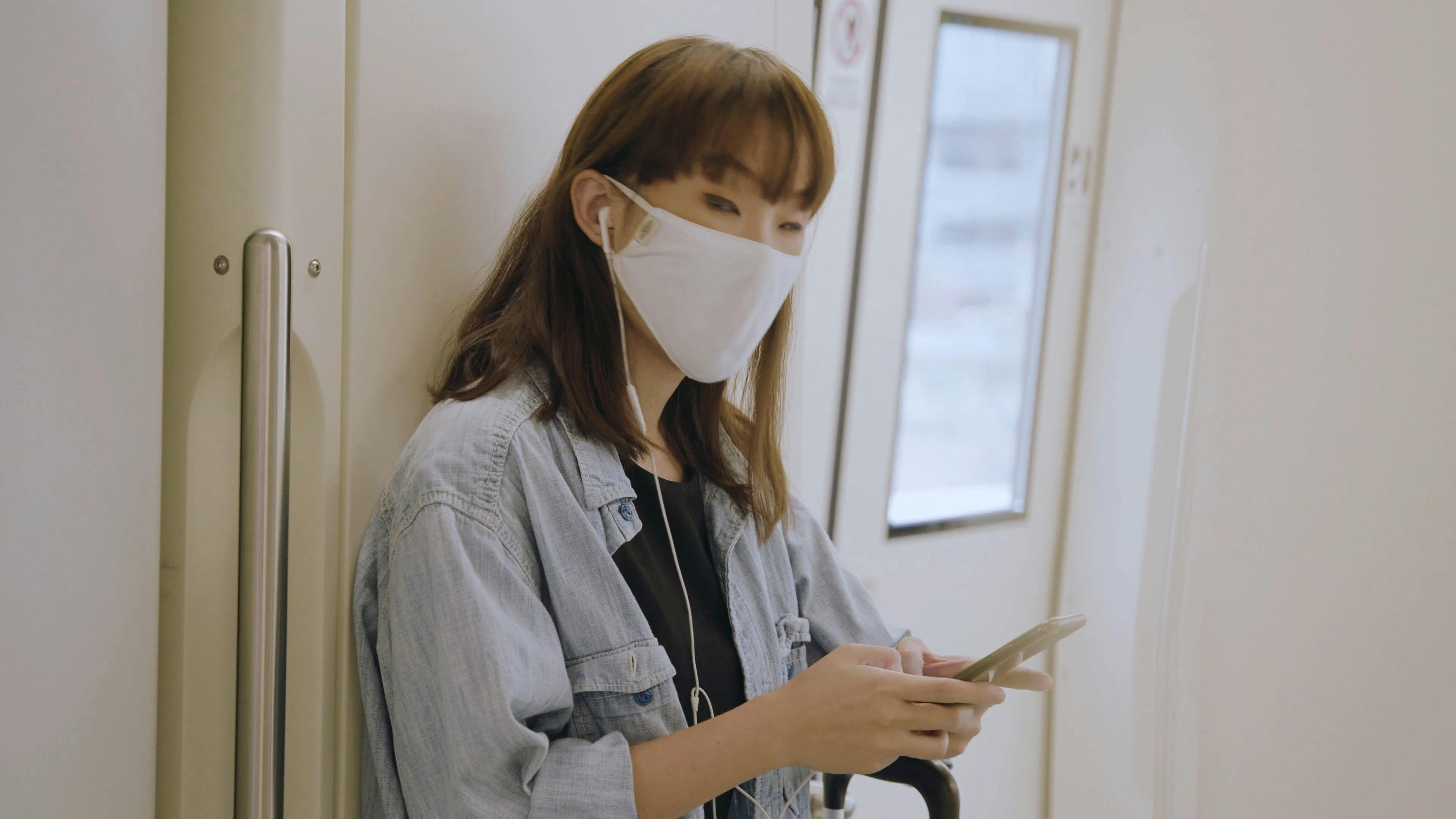 A Woman Standing Inside the Train · Free Stock Video