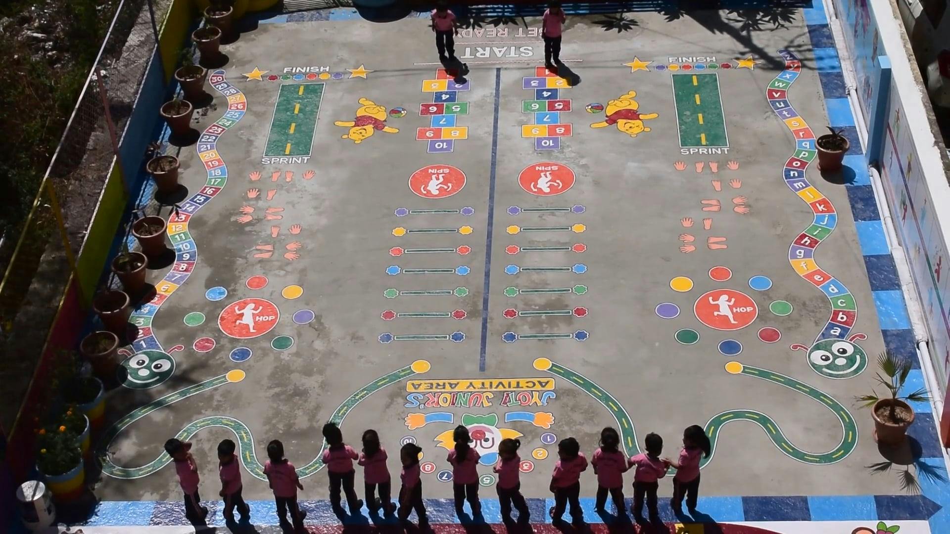 Children Walking On A Paved Pathway With Their Backpacks Free Stock ...