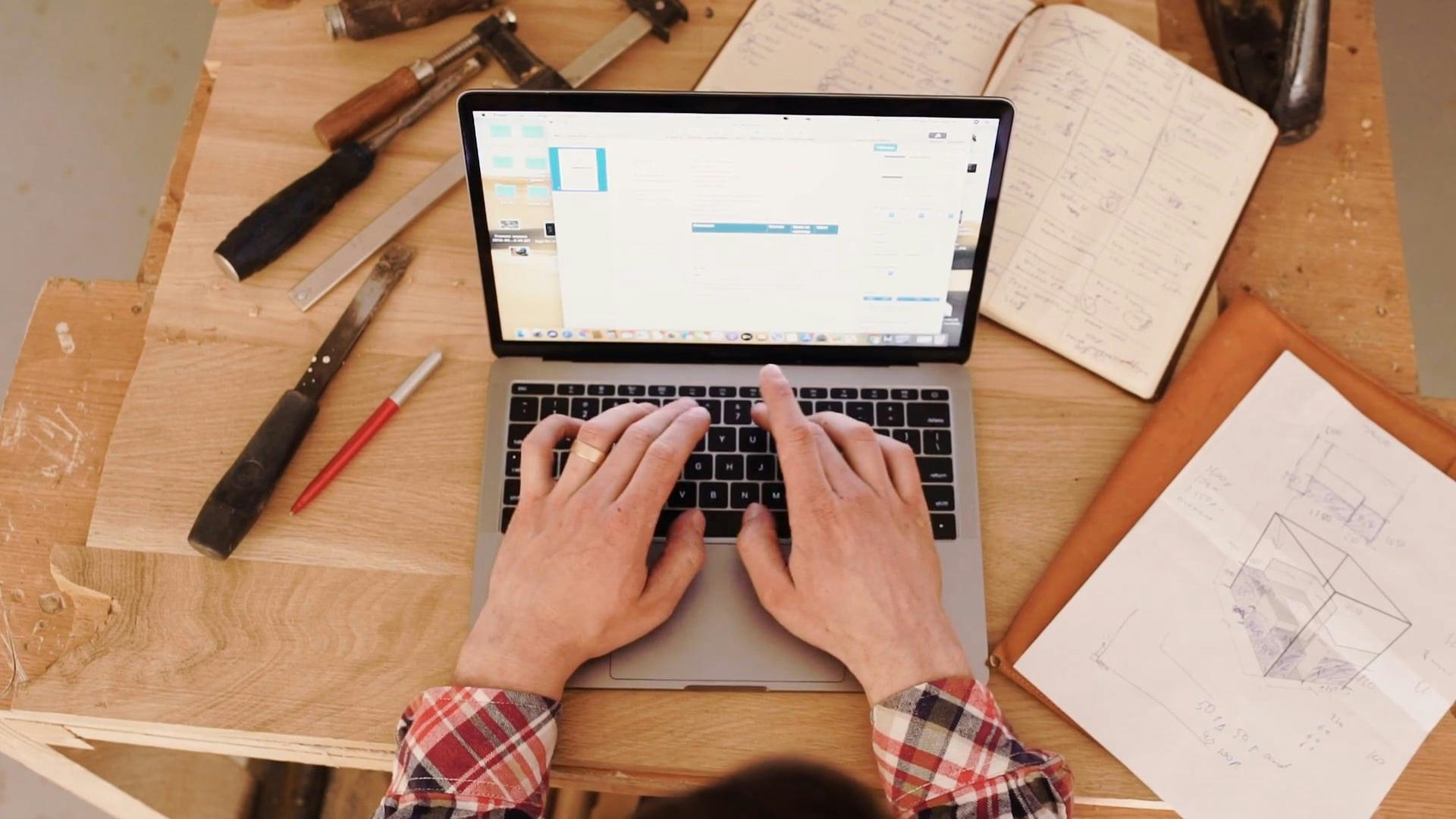 A Person Using A laptop In A Workshop Free Stock Video Footage, Royalty ...