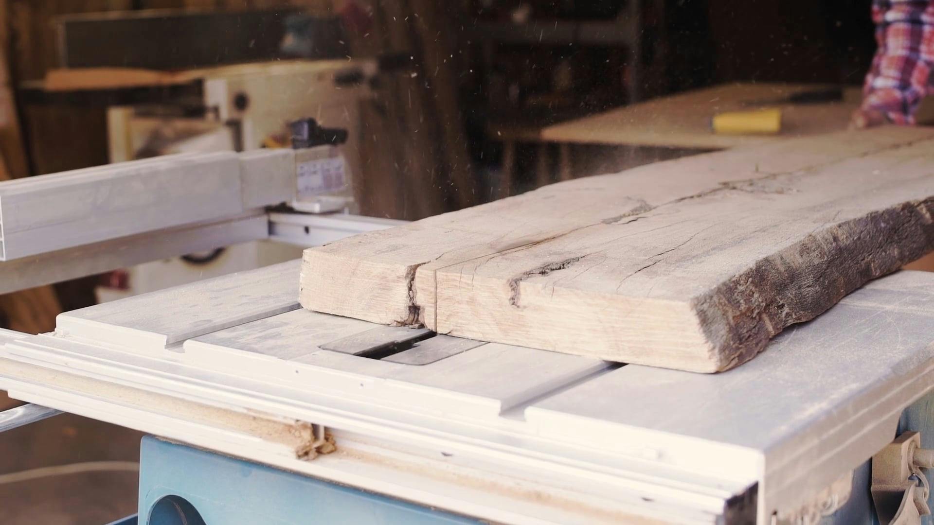 A Man Smoothing The Wood Edges Using A Sand Paper Free Stock Video ...