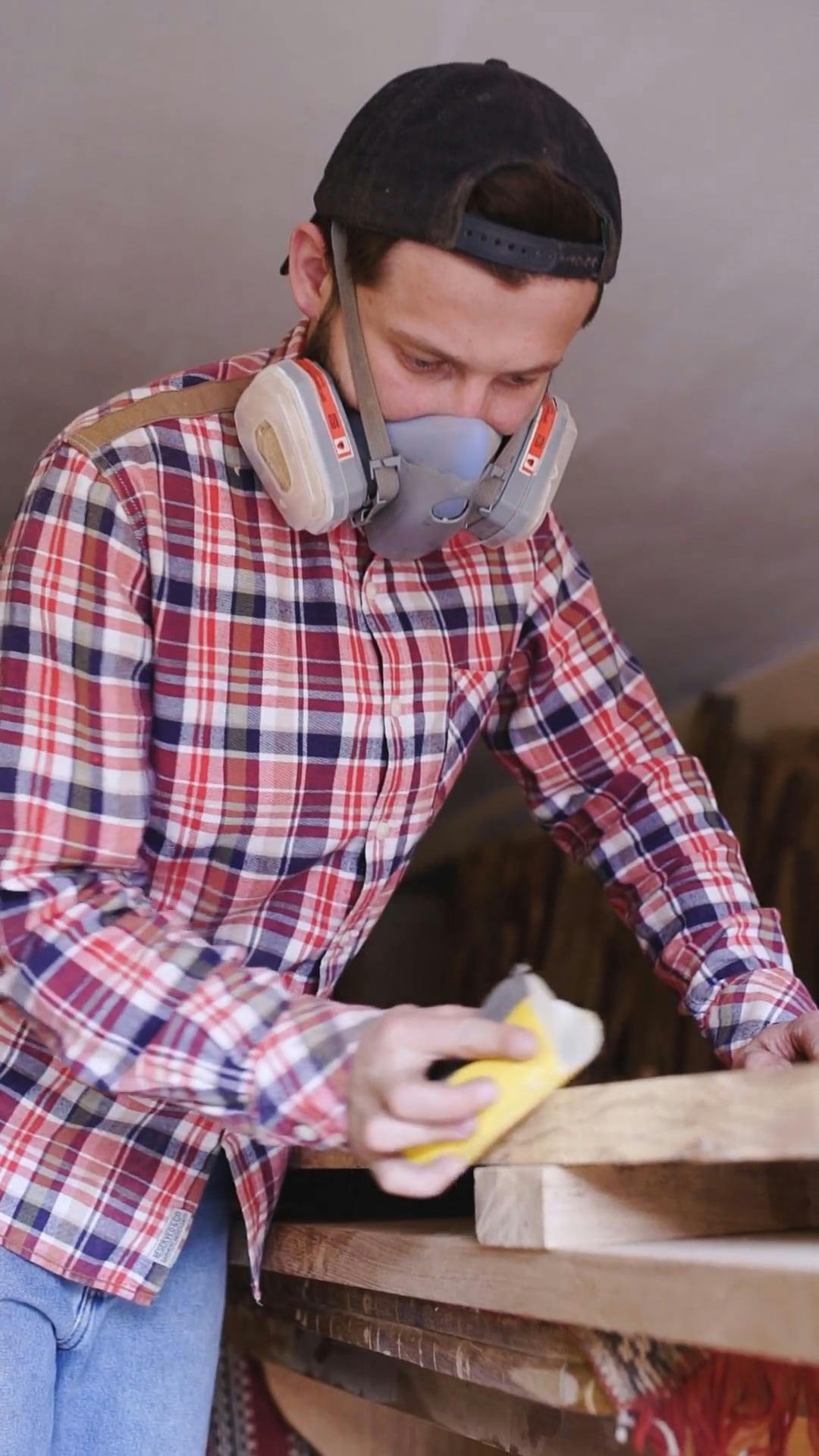 A Carpenter Cutting Away The Damaged Part Of A Wooden Board Free Stock ...