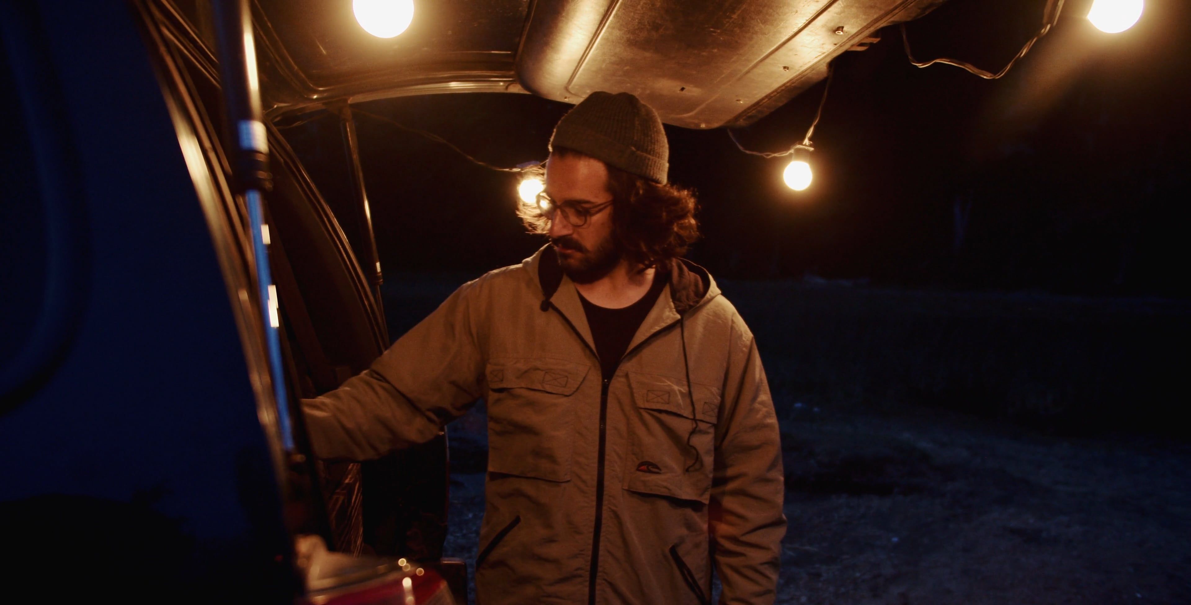 Man Standing Behind A Vehicle Holding A Camera Free Stock Video Footage ...