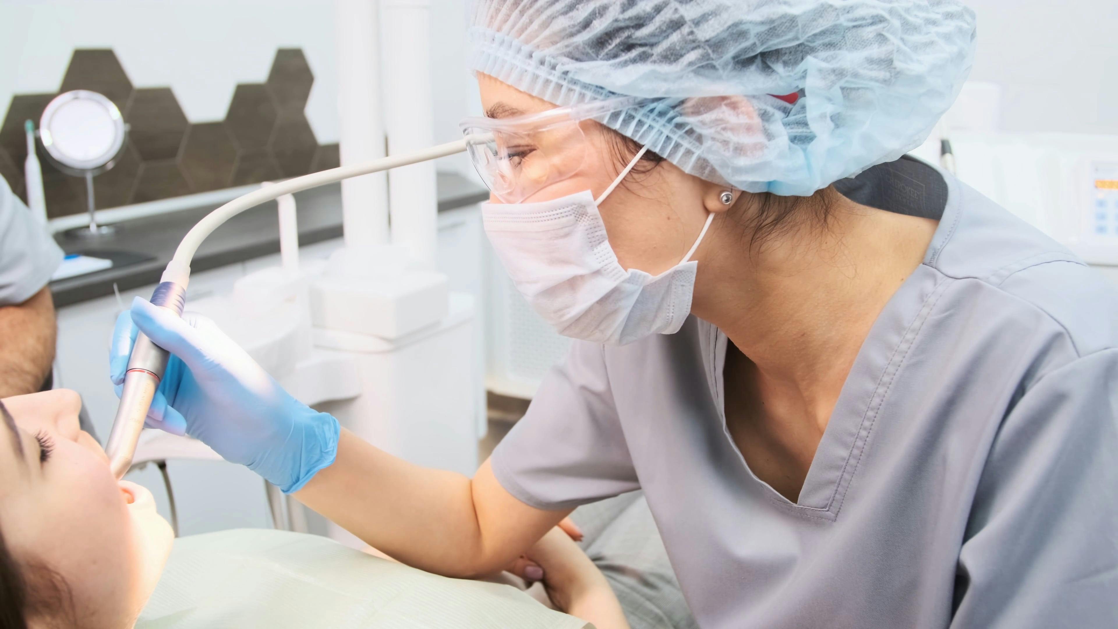 Woman Getting a Dental Cleaning · Free Stock Video