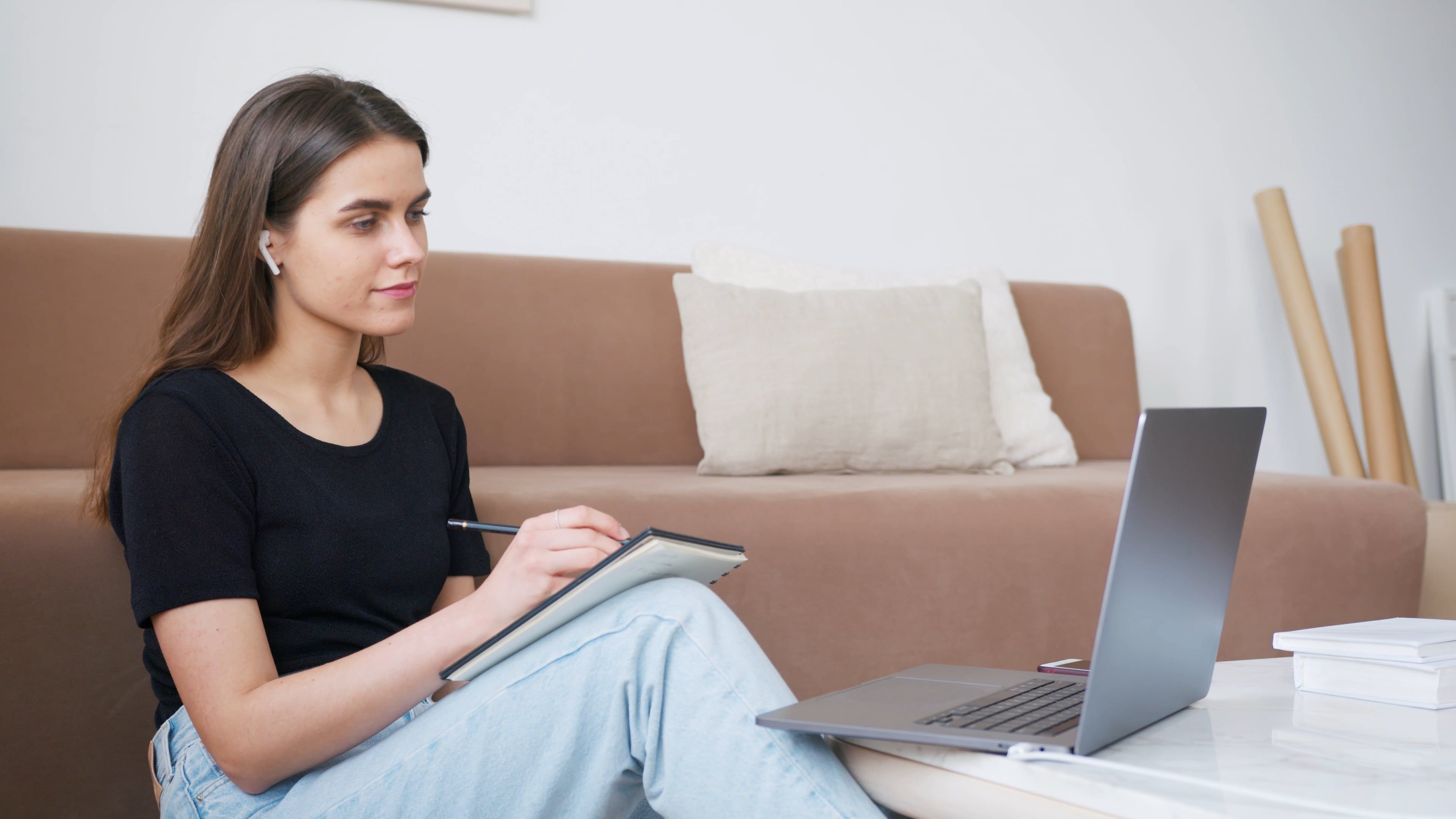 Woman Writing on a Notebook · Free Stock Video